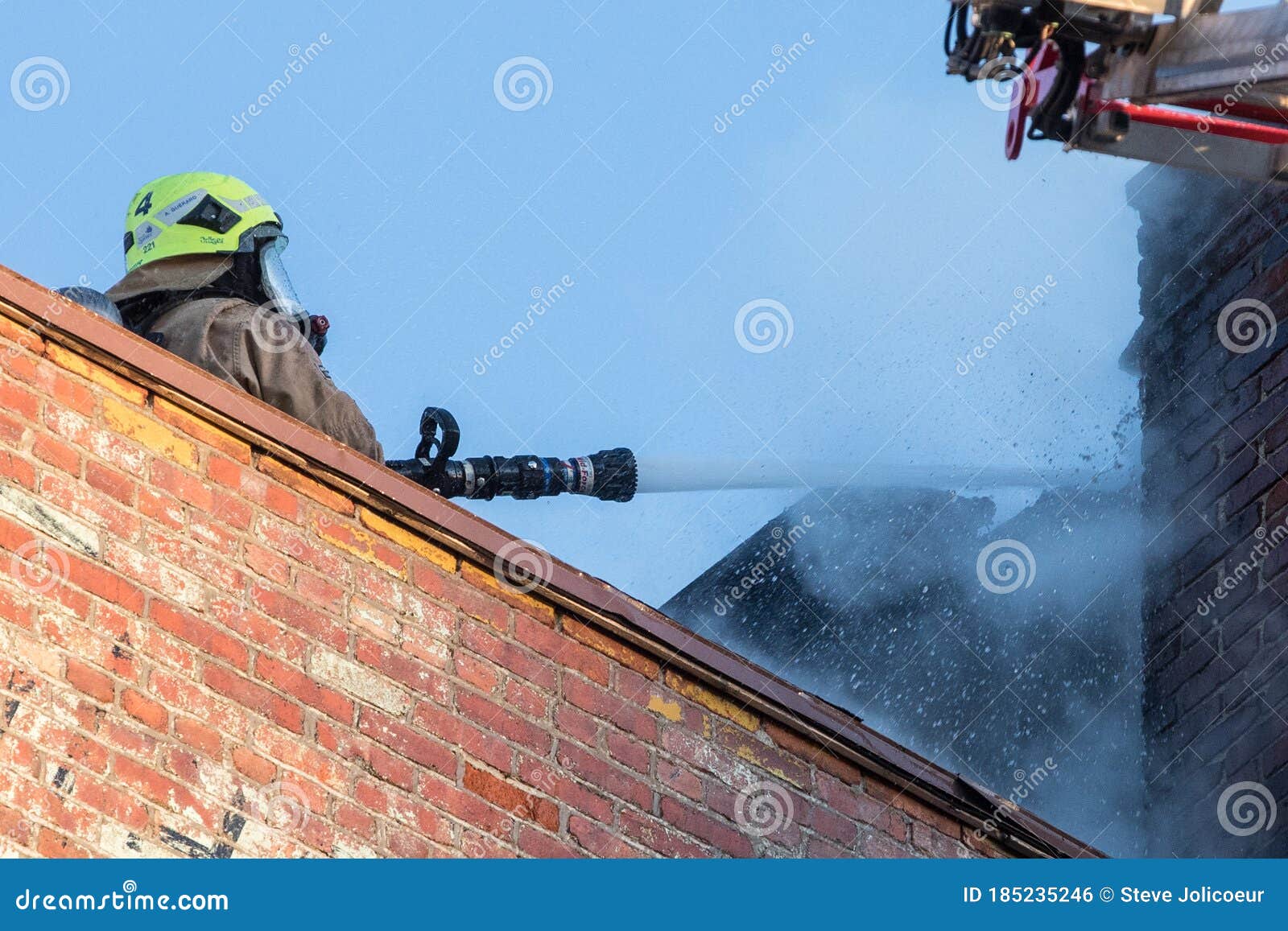 Firefighter Spray Water on Wall with Hose. Editorial Photo - Image of ...