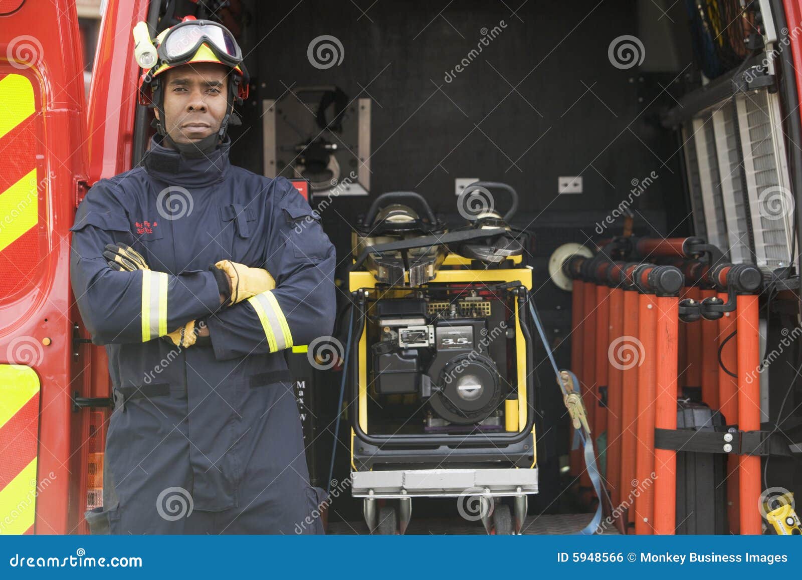 Firefighter Standing by the Equipment Stock Photo - Image of fire ...