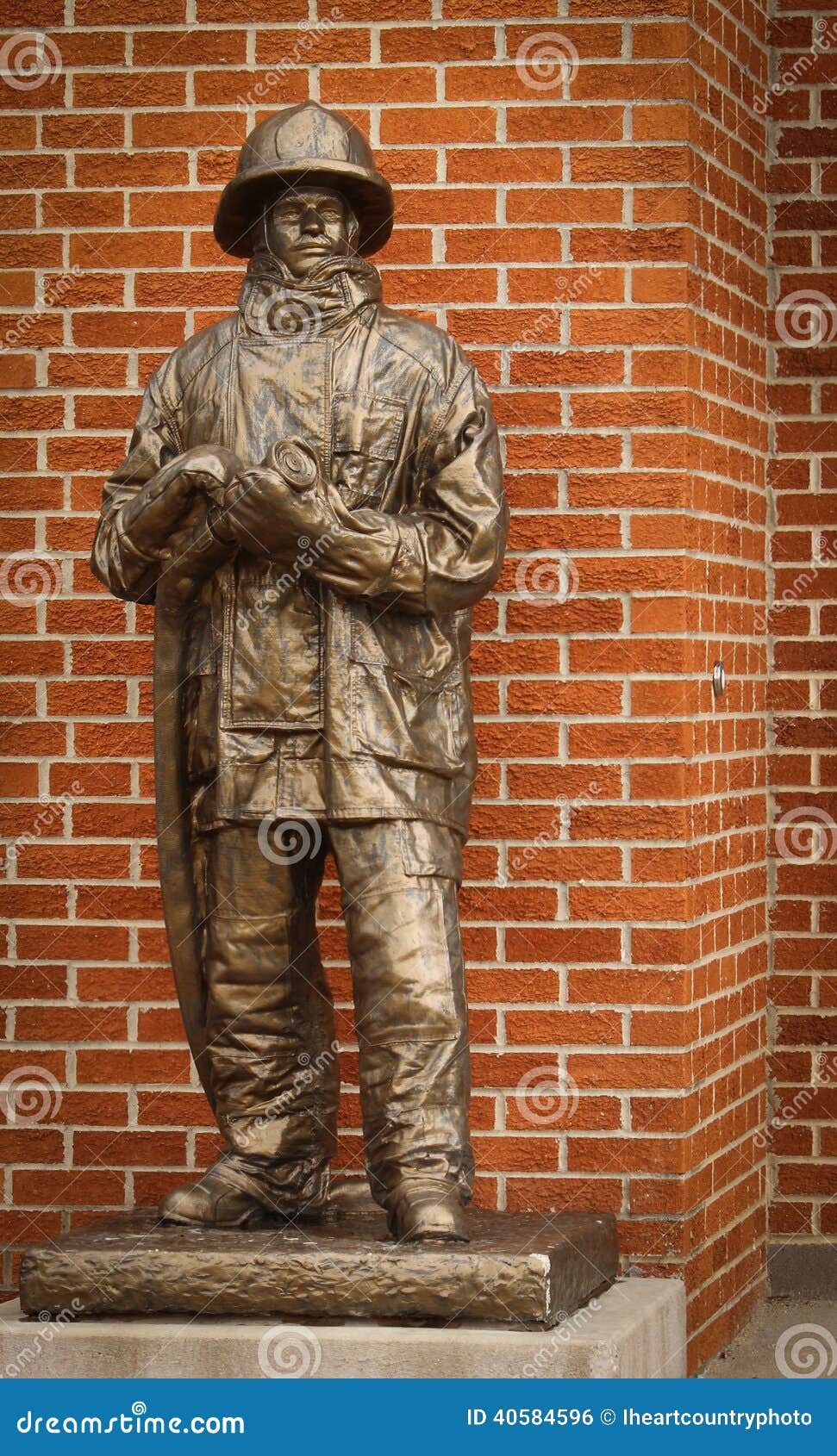 Firefighter Statue stock photo. Image of hero, bronze - 40584596
