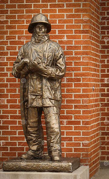 Firefighter Statue stock photo. Image of hero, bronze - 40584596