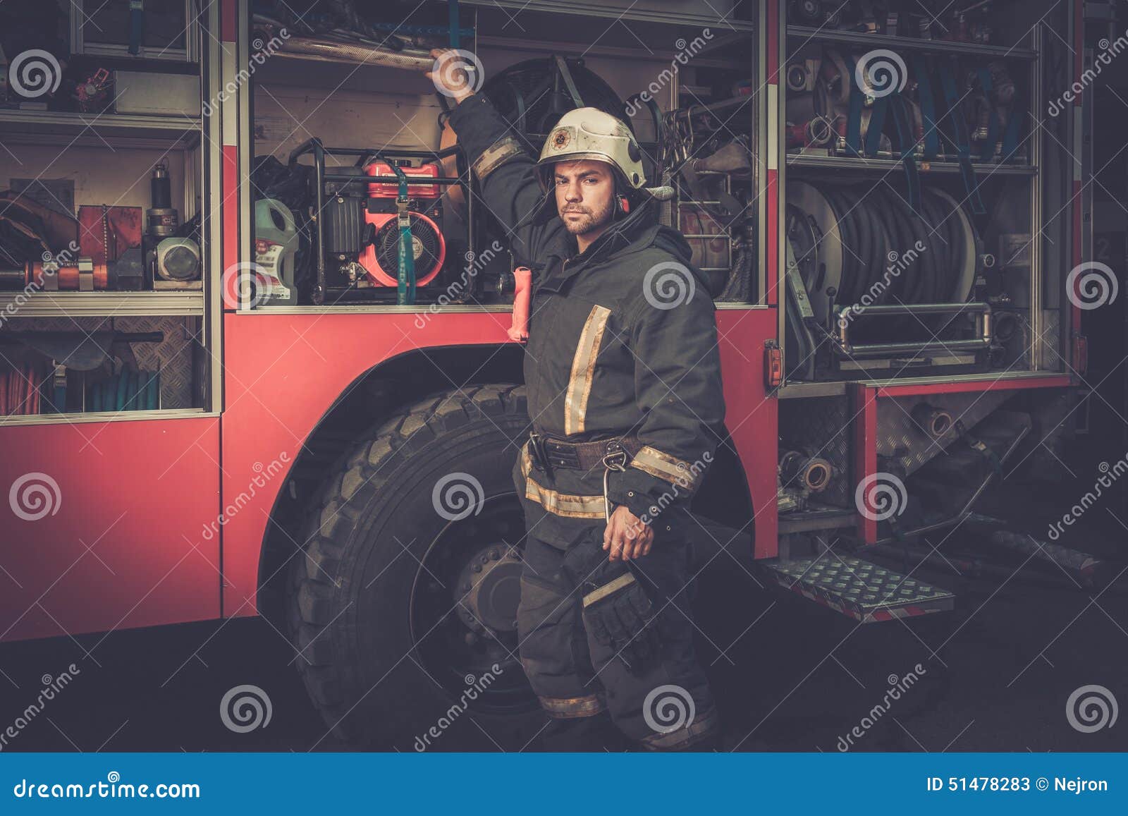 Firefighter in Storage Room Stock Image - Image of gear, firefighting ...