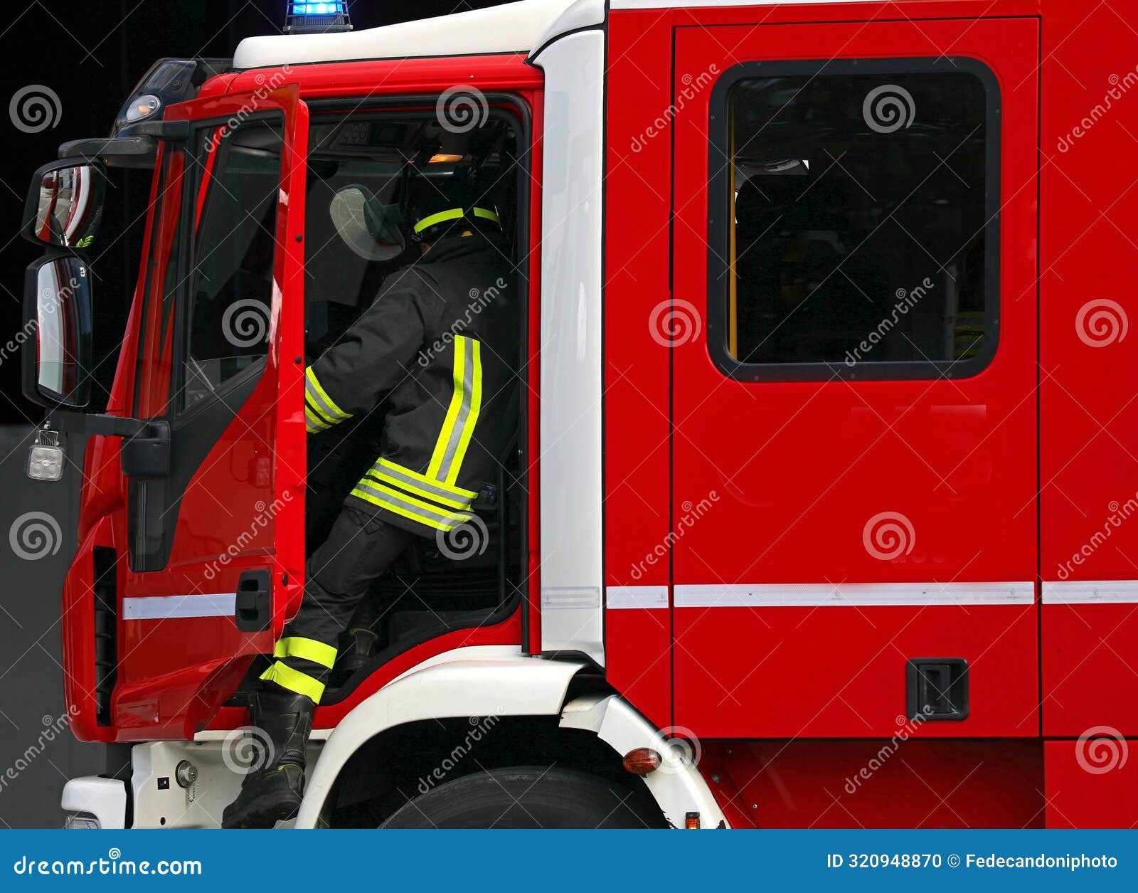 Firefighter Swiftly Disembarking Fire Truck during Emergency Stock ...