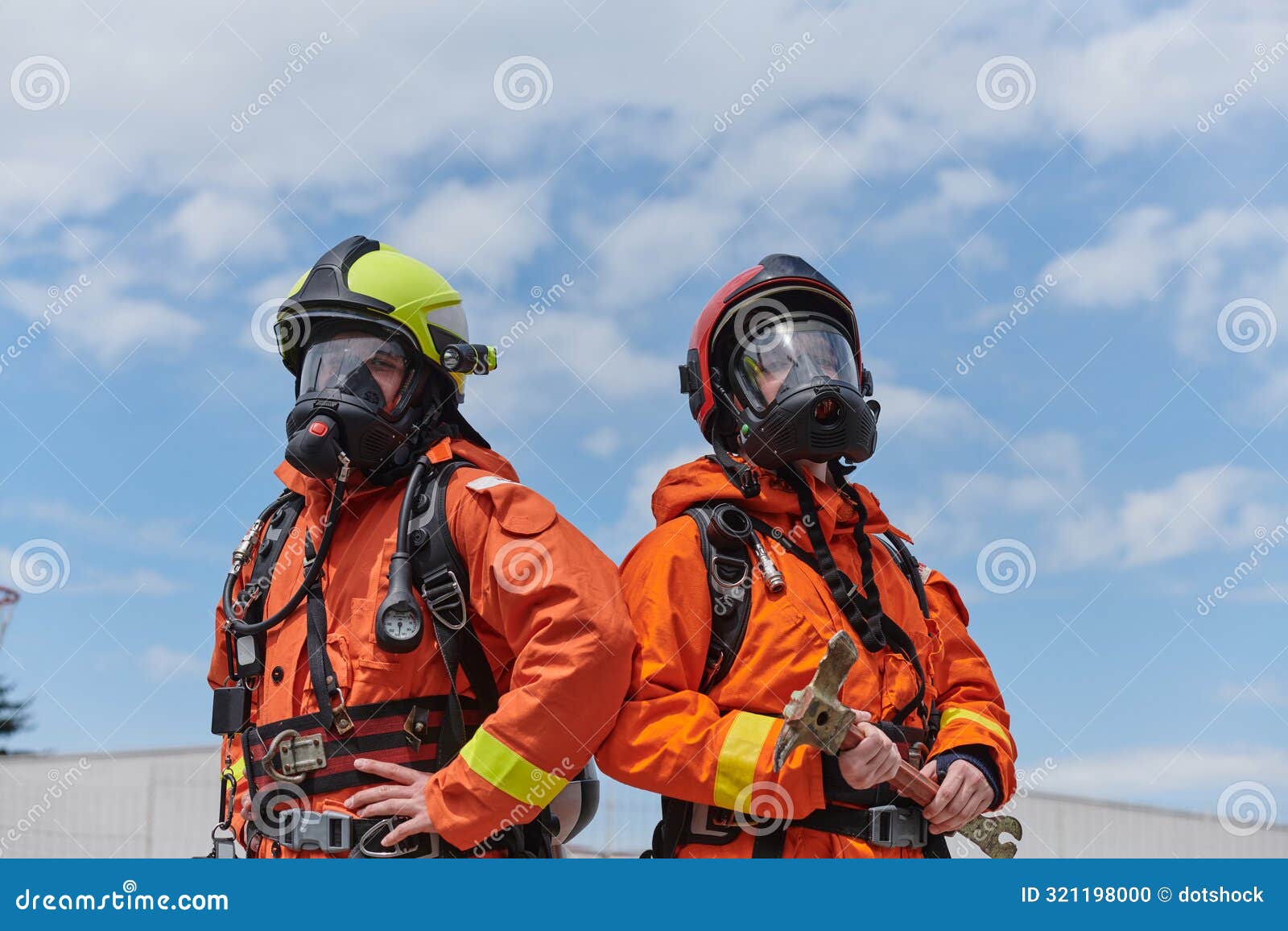 Firefighter Team Training with Various Tools in Professional Gear Stock ...