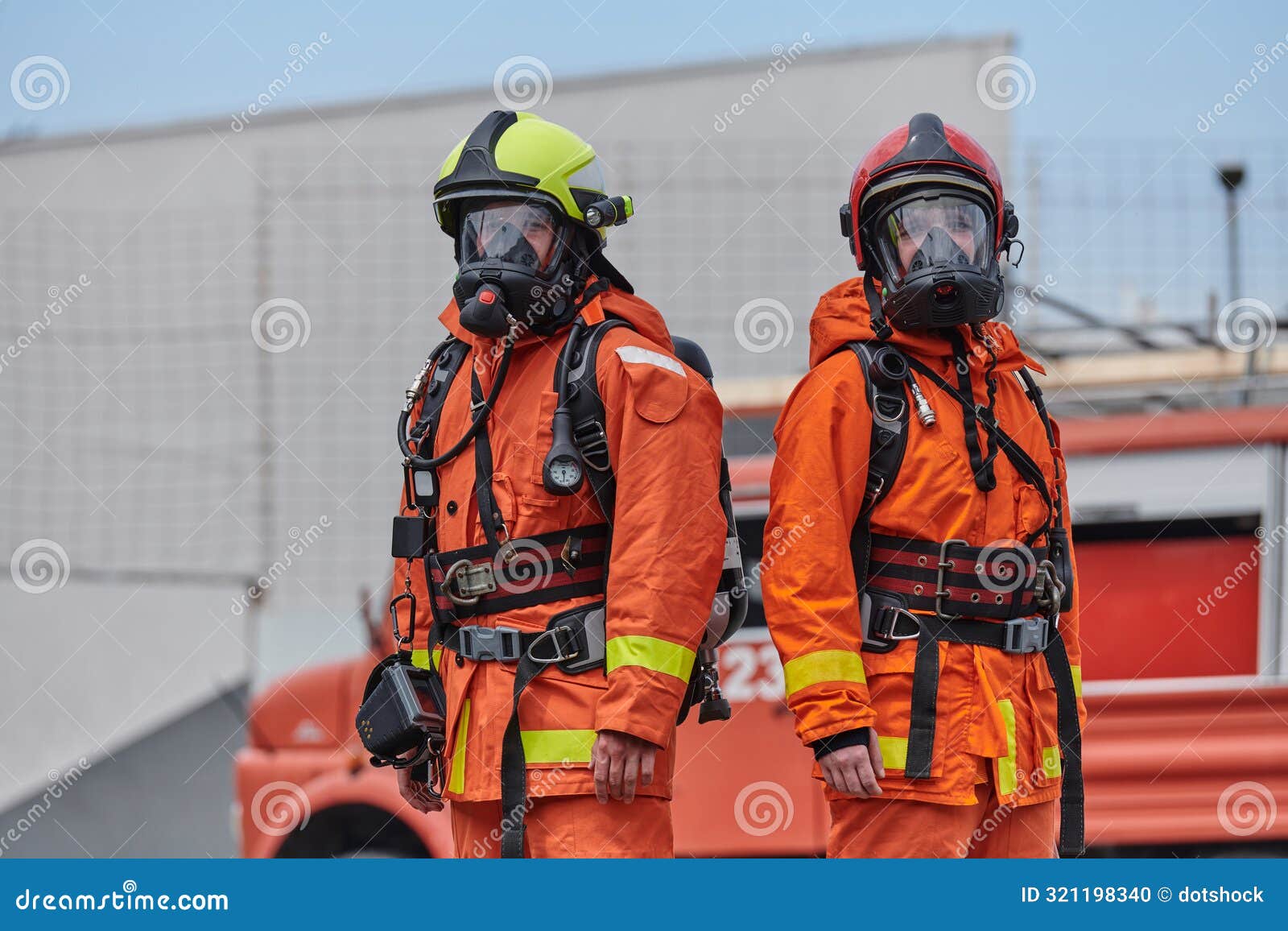 Firefighter Team Training with Various Tools in Professional Gear Stock ...