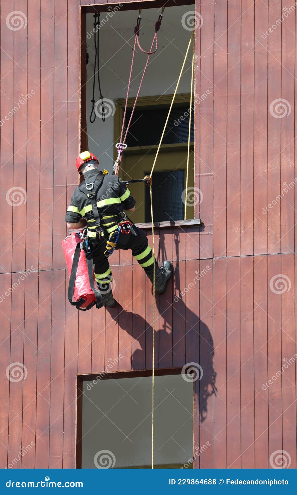 Firefighter during a Training for Entry through the Window Durin Stock ...
