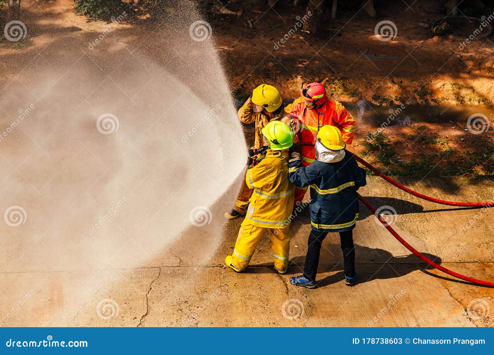 Fireman Using Water And Extinguisher,fireman Using Water And ...