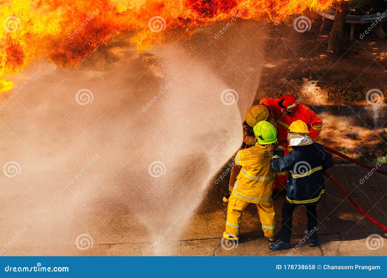 Firefighter Training., Fireman Using Water And Extinguisher To Fighting ...