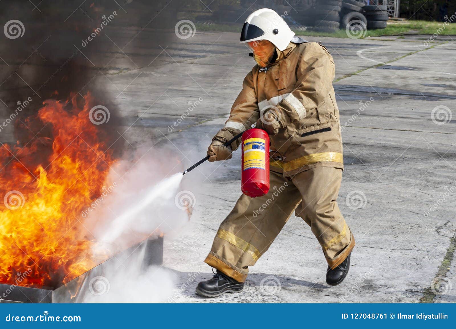 Firefighter during Training with a Huge Fire in the Brazier Editorial ...