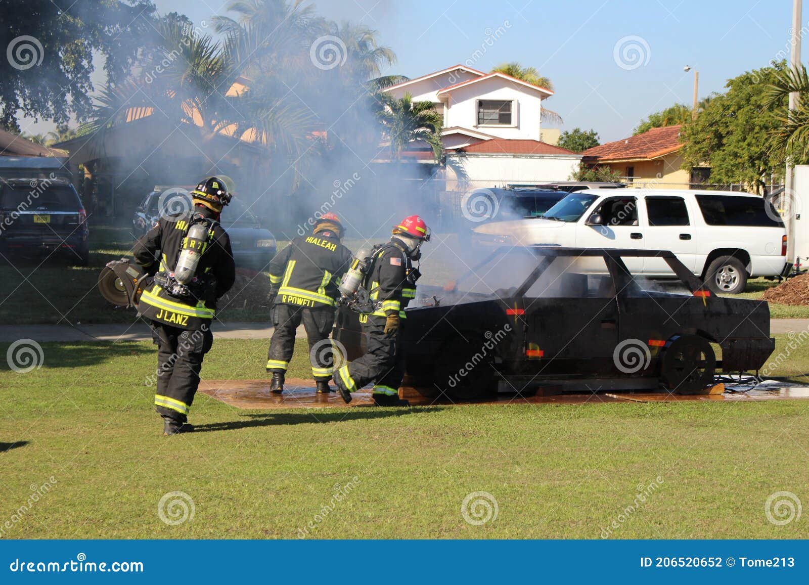 Fireman Turning Valve Of Water Pump System During Fire Fighting ...