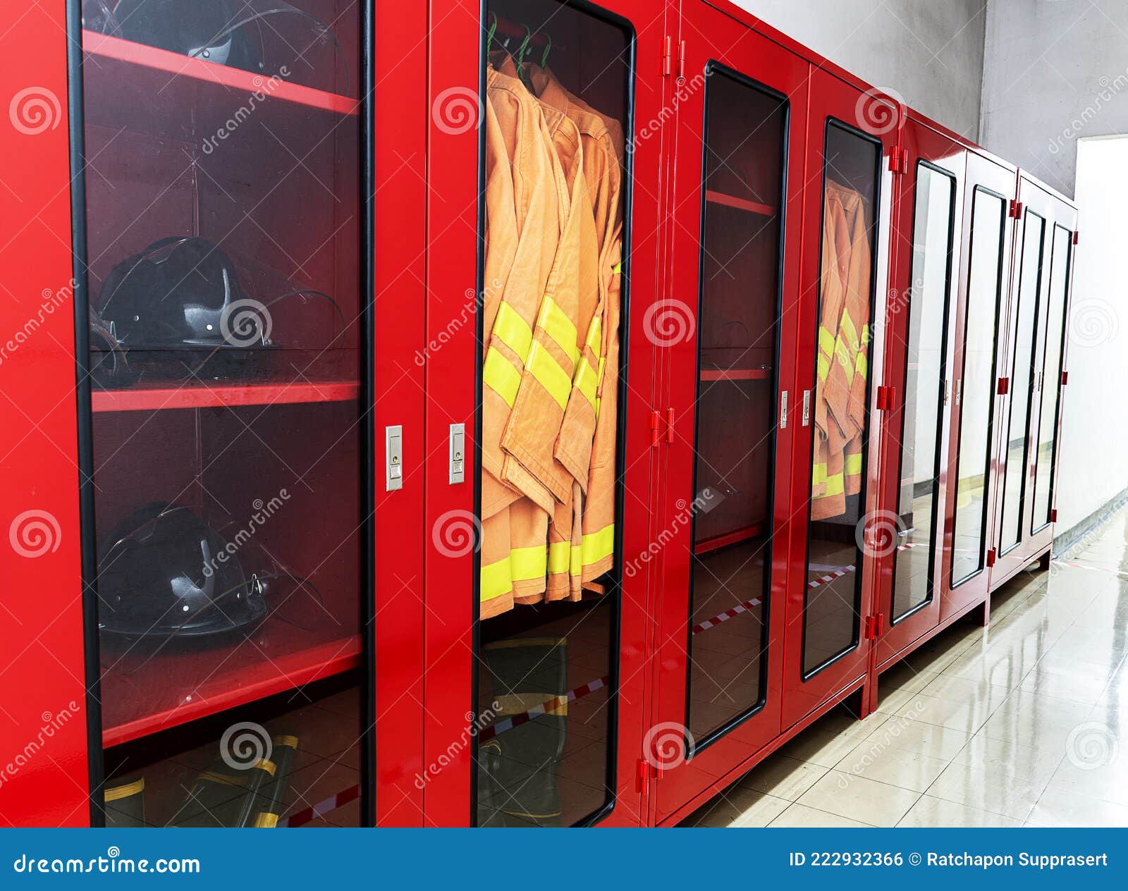 Firefighter Uniforms in the Red Locker Stock Photo - Image of clothing ...