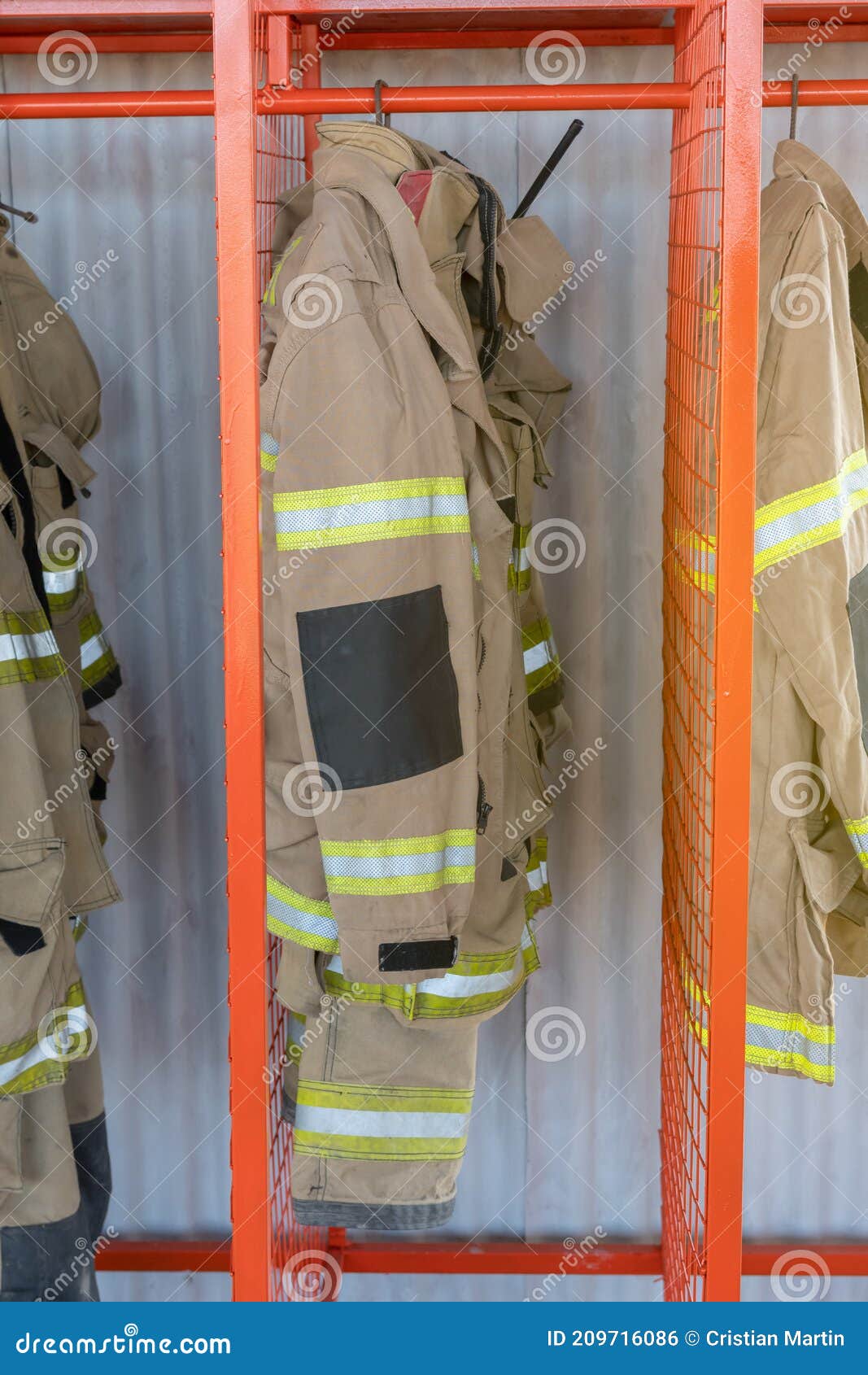 Firefighter Uniforms at Station Vertical Photo Stock Photo - Image of ...