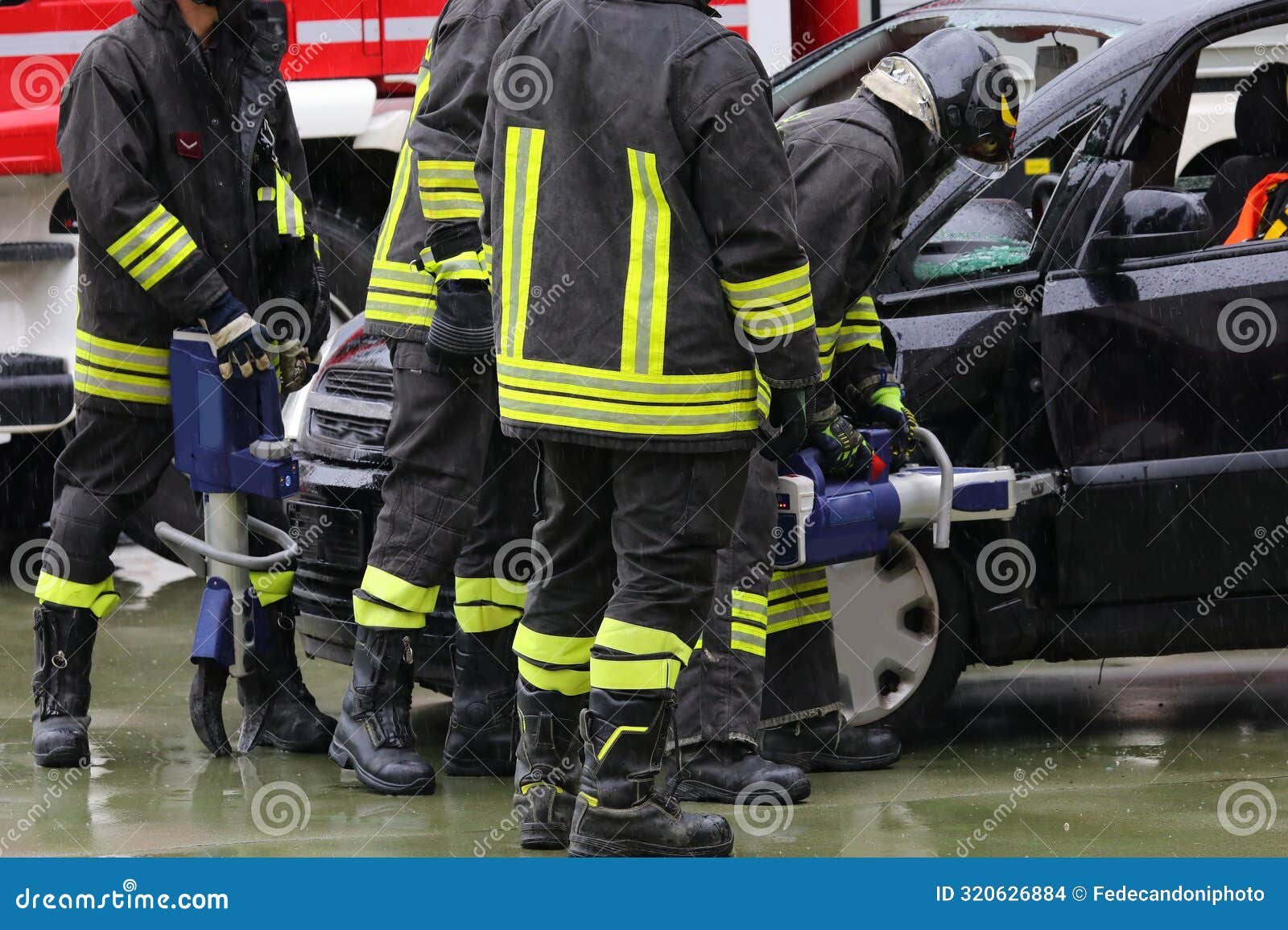 Firefighter Using Powerful Cordless Pneumatic Shears To Open the Jammed ...