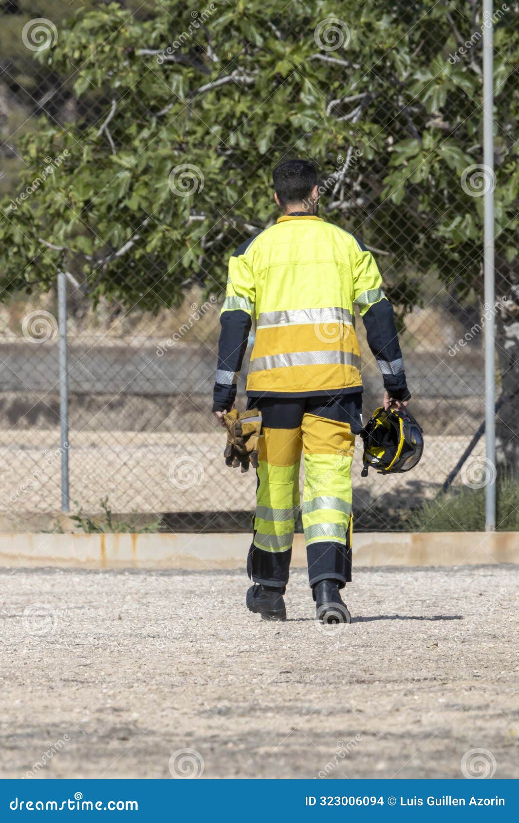 Firefighter Walking Backwards in Uniform Stock Photo - Image of outside ...