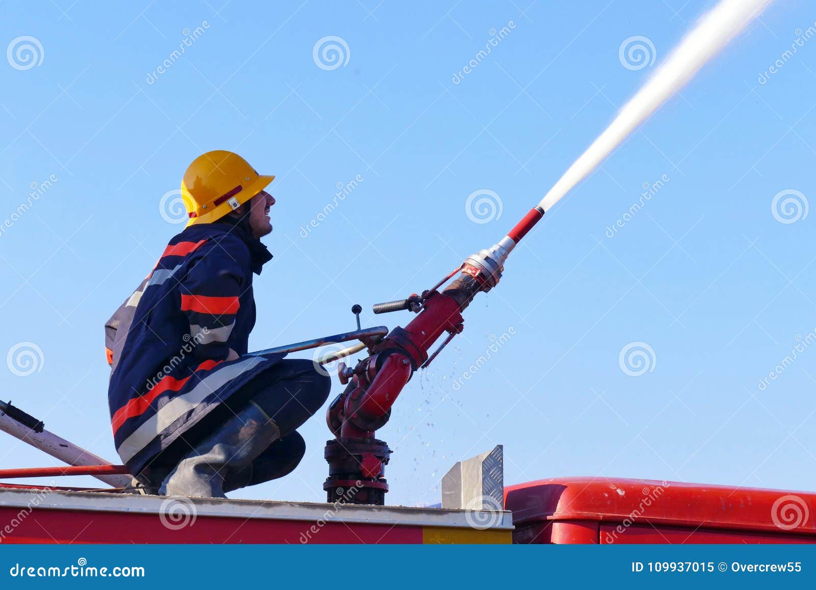 Firefighter Water Jet On Big Storage Tank Royalty-Free Stock Photo ...