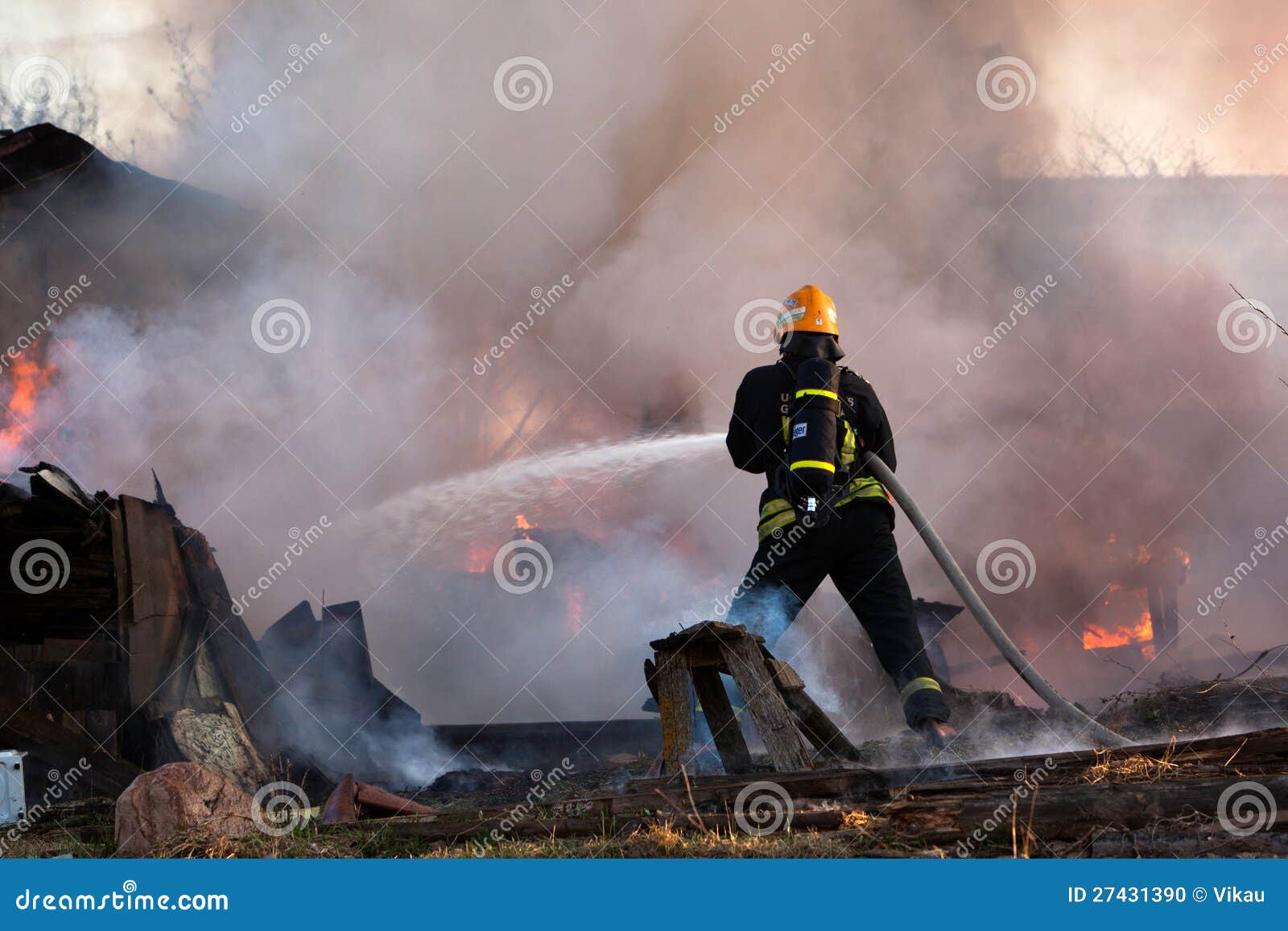 Firefighter at work stock photo. Image of doomsday, blaze - 27431390
