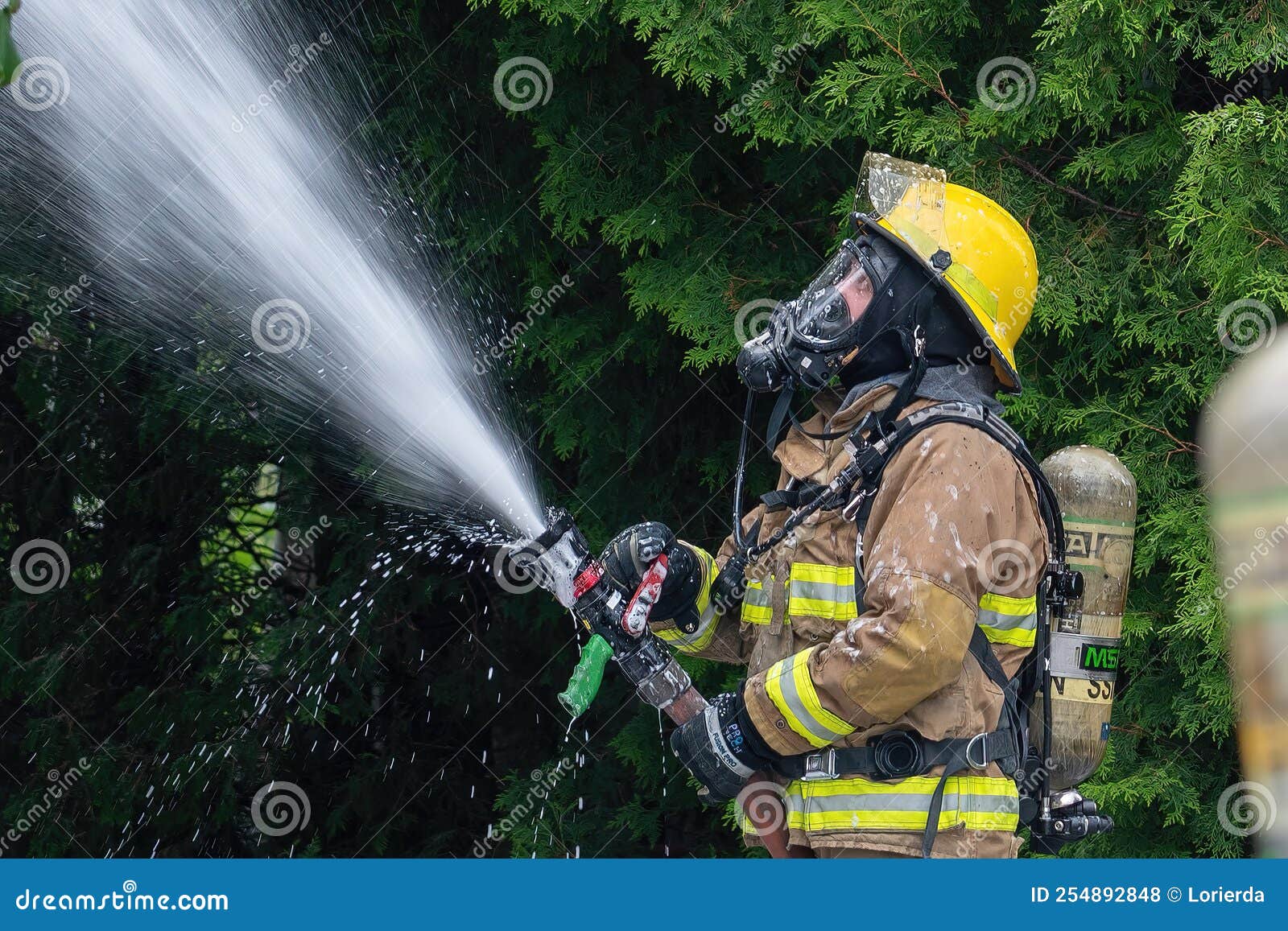 Firefighter At Work With Ax On Extinguishing The Fire Editorial Photo ...