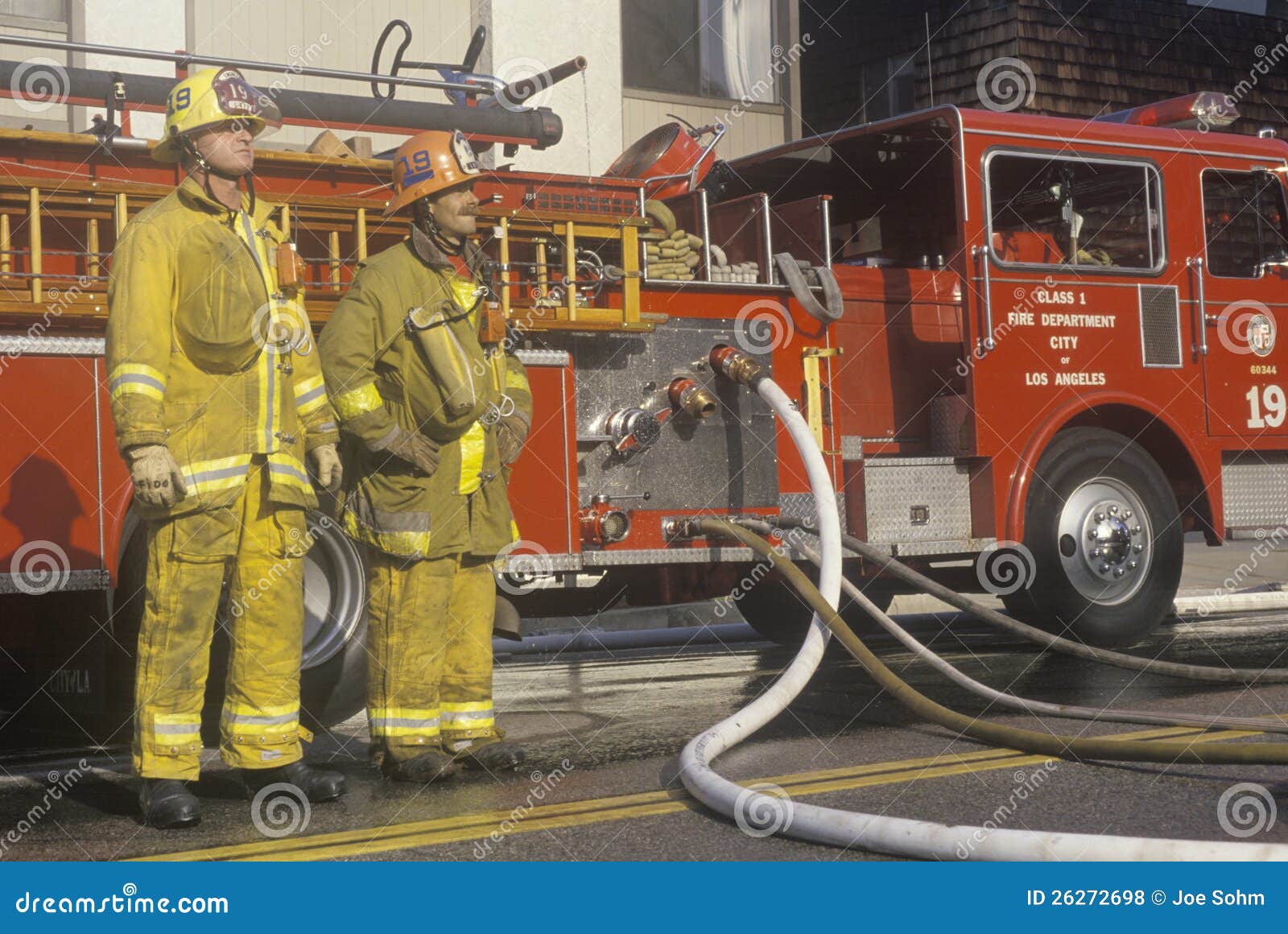 Firefighter Working with Fire Hose Editorial Stock Photo - Image of ...