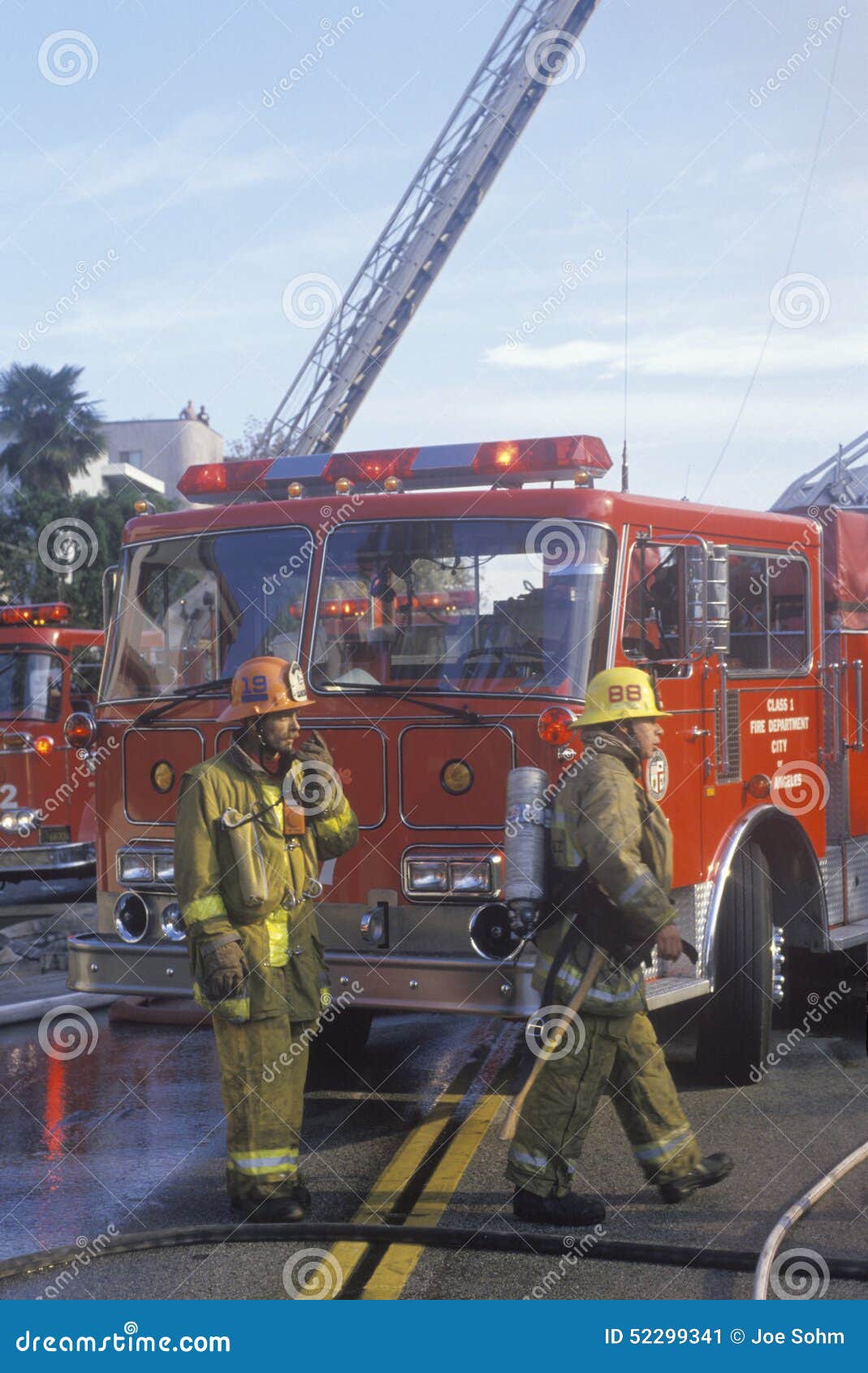 Firefighter Working with Fire Hose, Los Angeles, California Editorial ...