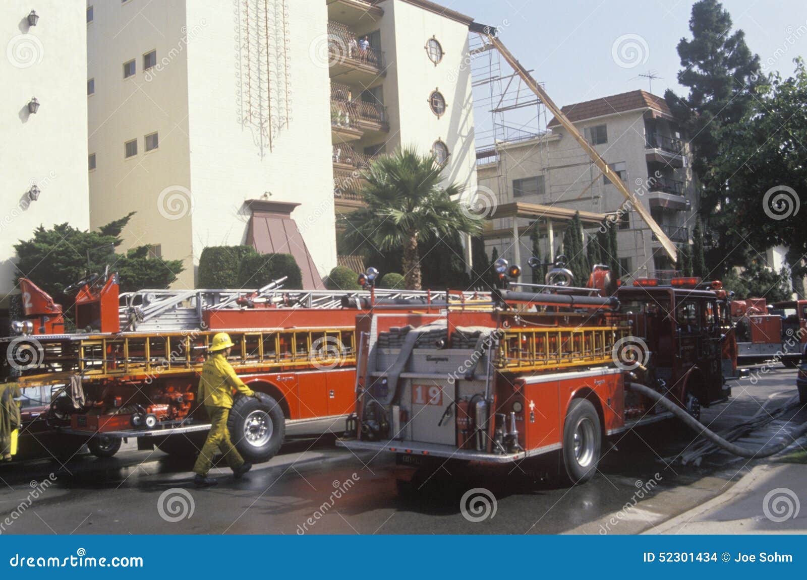 Firefighter Working with Fire Hose, Los Angeles, California Editorial ...