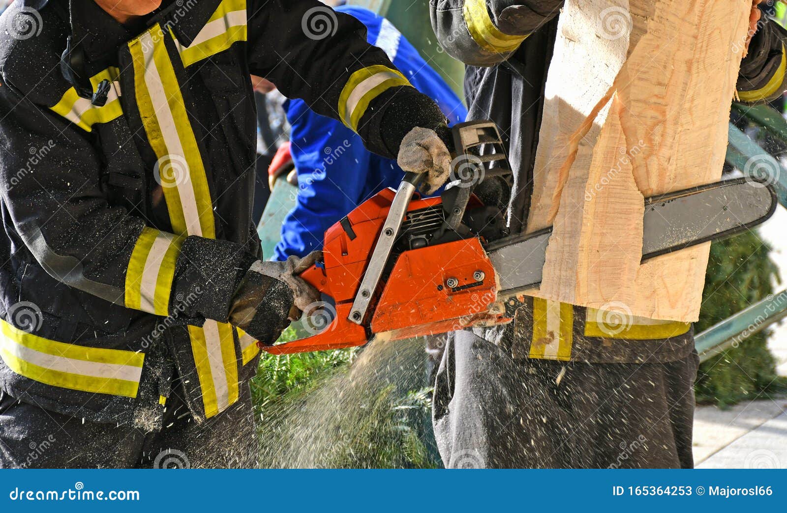 Firefighter Works with a Chainsaw Outdoor Stock Image - Image of class ...