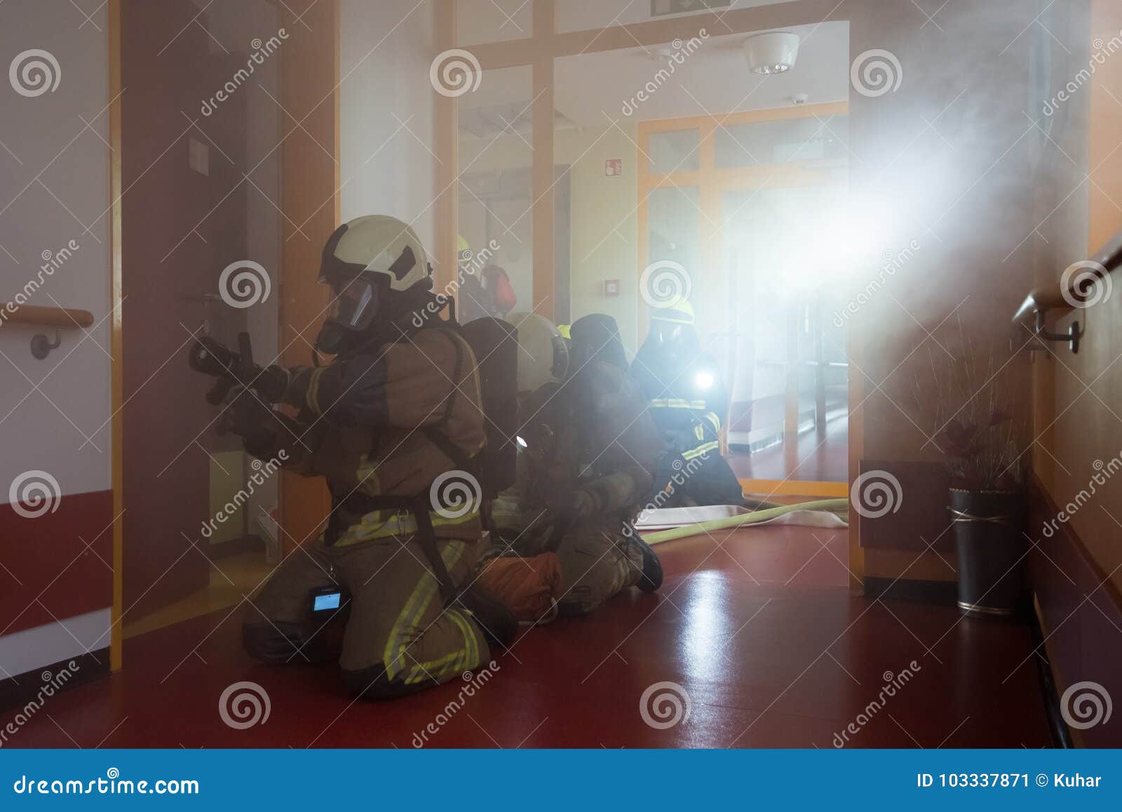 Firefighters in action stock image. Image of fighter - 103337871