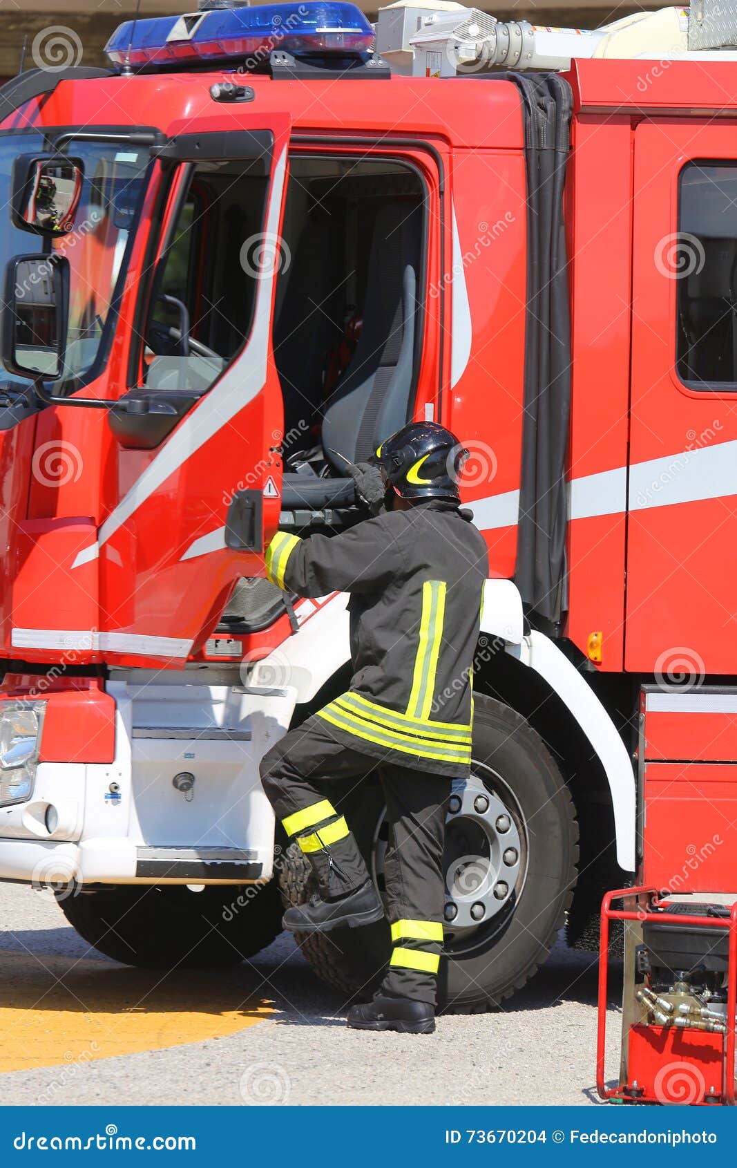 Firefighters in Action Jump Down Quickly from the Fire Engine Du Stock ...