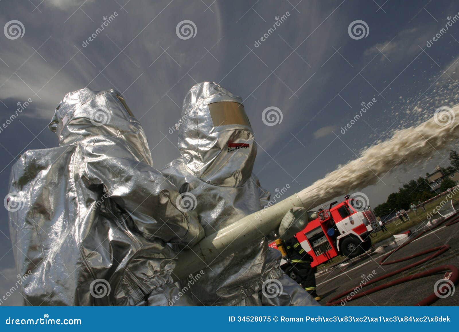 Firefighters in action editorial image. Image of suit - 34528075