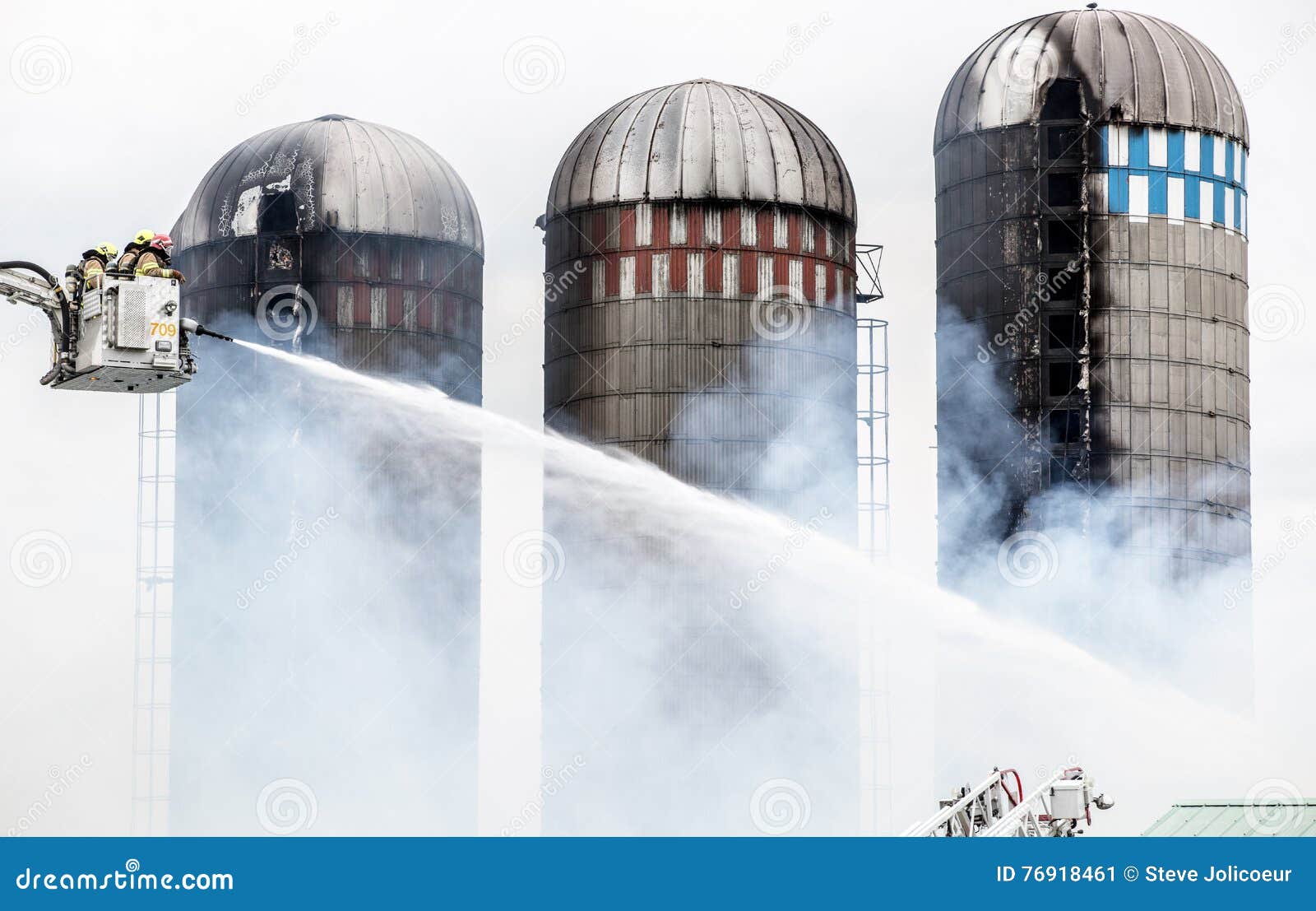Firefighters Battle Silo and Barn Fire. Stock Image - Image of intense ...