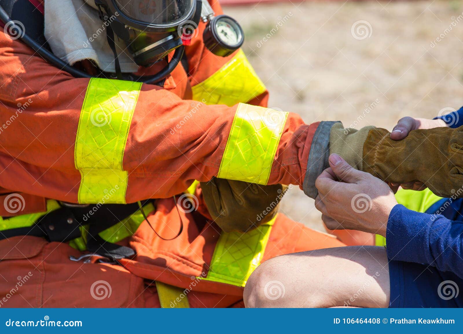 Firefighters Buddy Help To Wearing Fire Protection Gloves Stock Photo ...