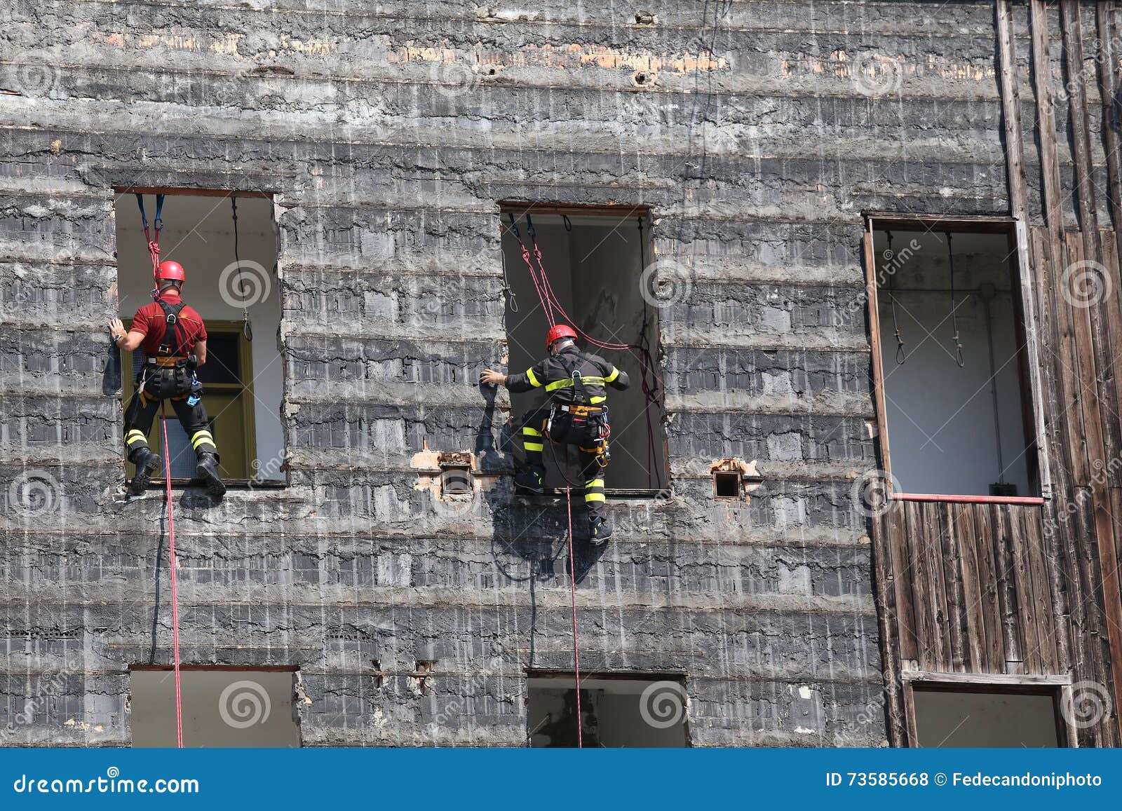 Climber Of Firefighters With Red Helmet Falls From The Ladder Tr ...