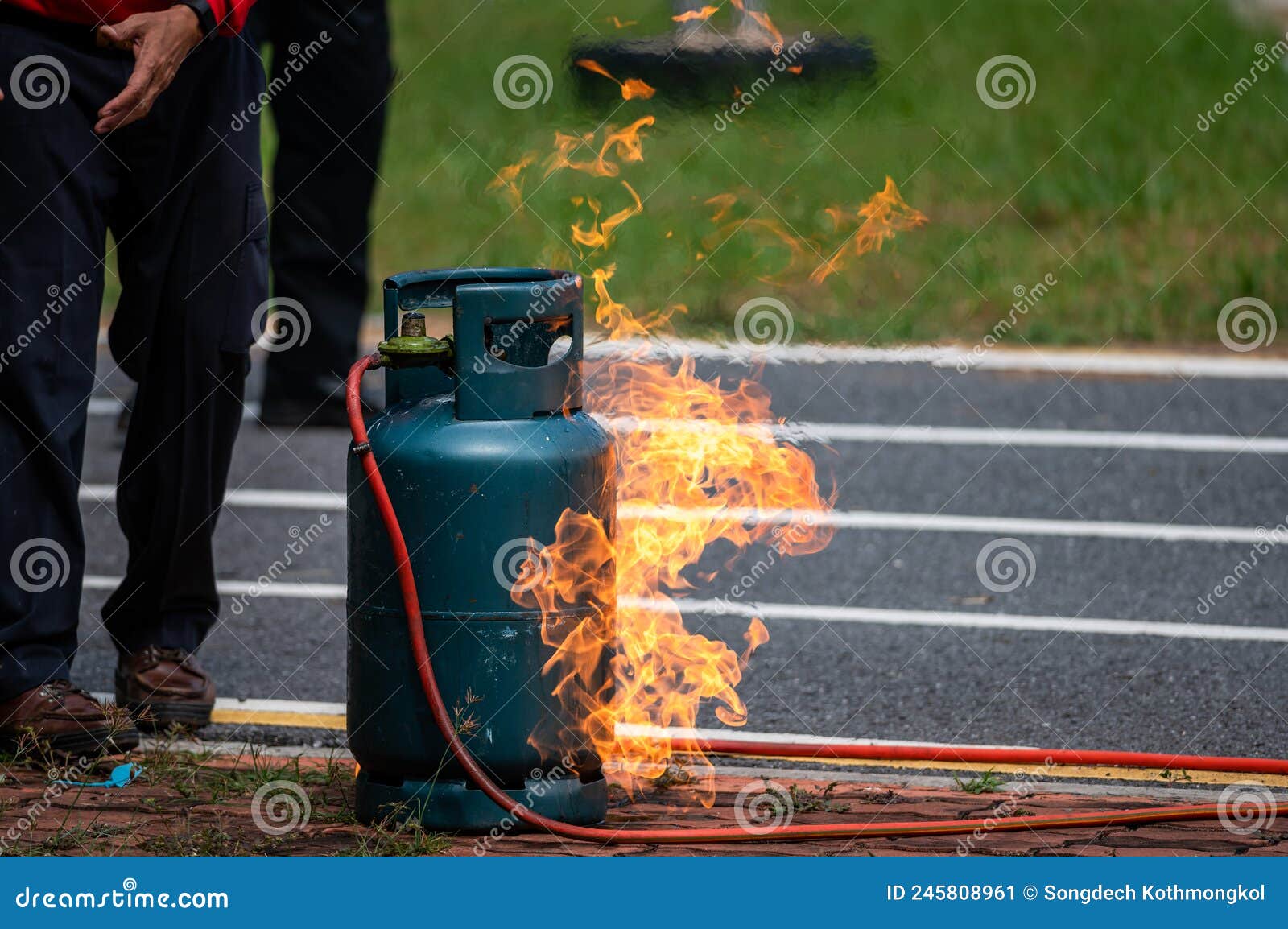 Fire demonstration stock image. Image of extinguisher - 245808961