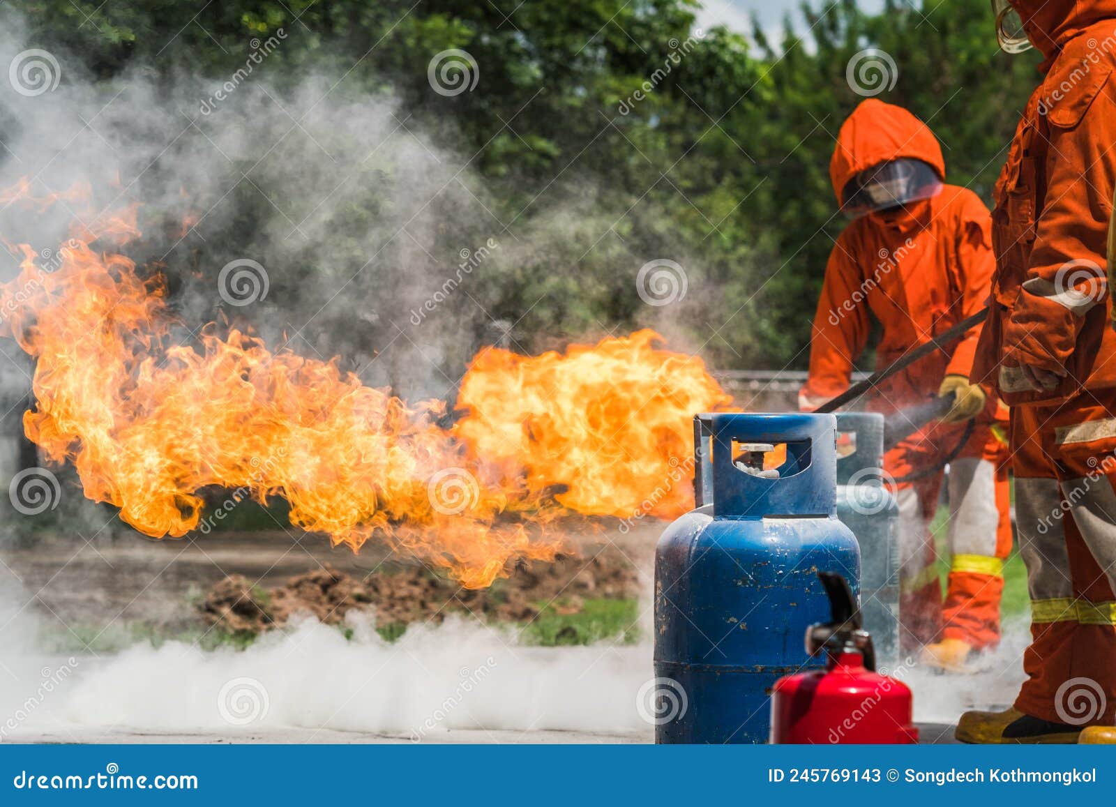 Fire demonstration stock image. Image of vest, spray - 245769143