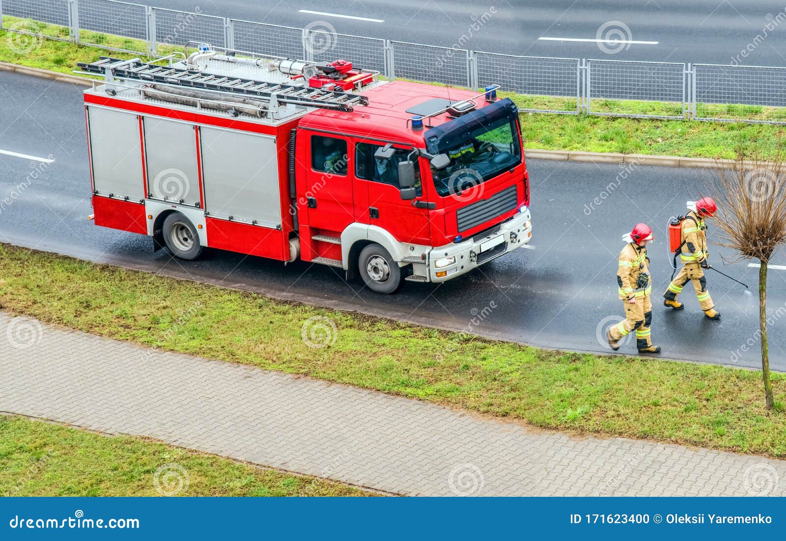 . Fire Engine Driving Down Street Stock Photo - Image of department ...