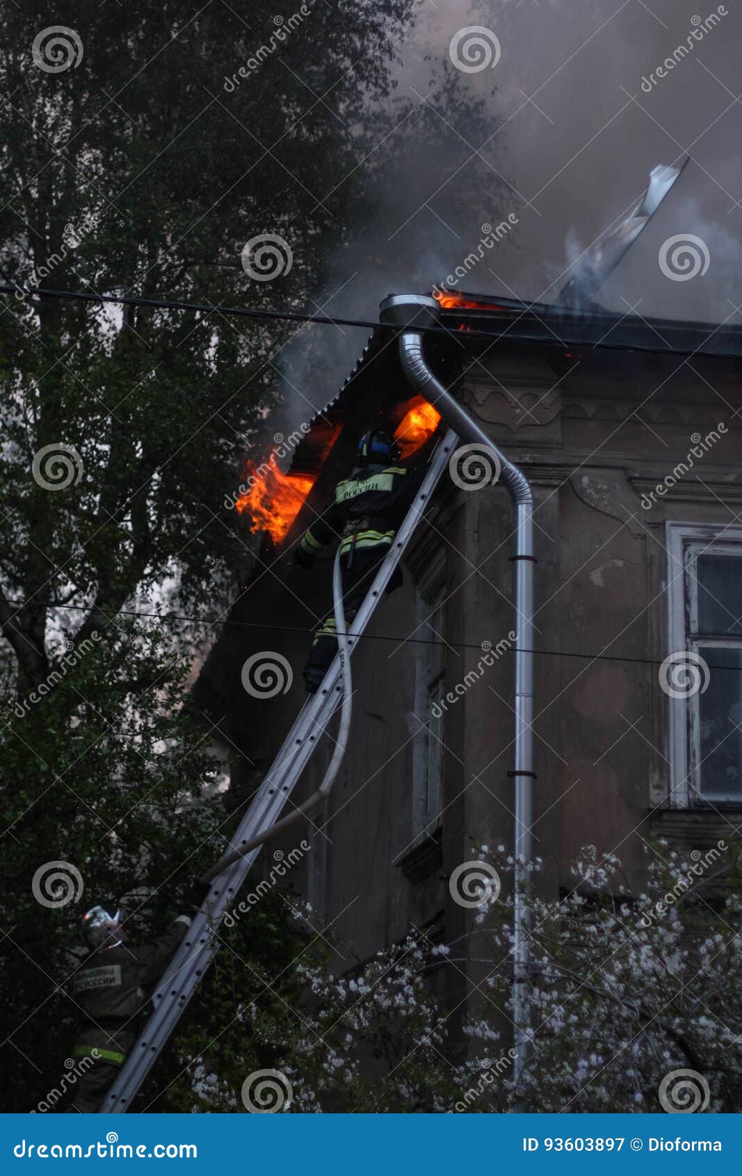 Firefighters Extinguish a Fire in an Old House Stock Image - Image of ...
