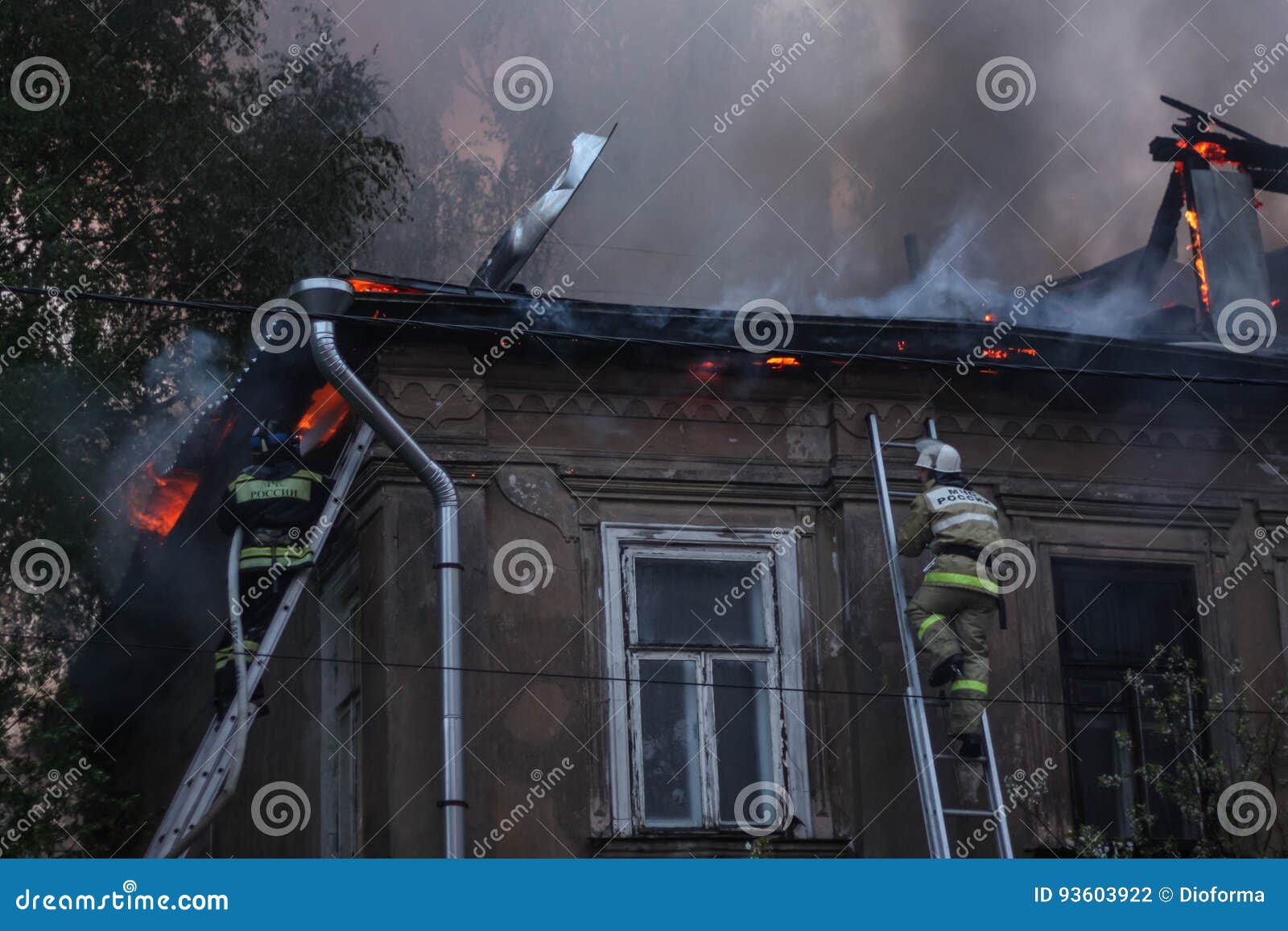Firefighters Extinguish a Fire in an Old House Stock Photo - Image of ...