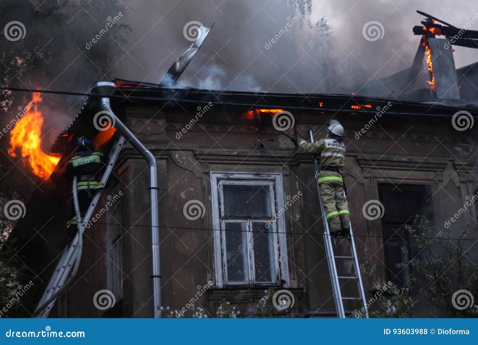 Firefighters Extinguish a Fire in an Old House Stock Photo - Image of ...