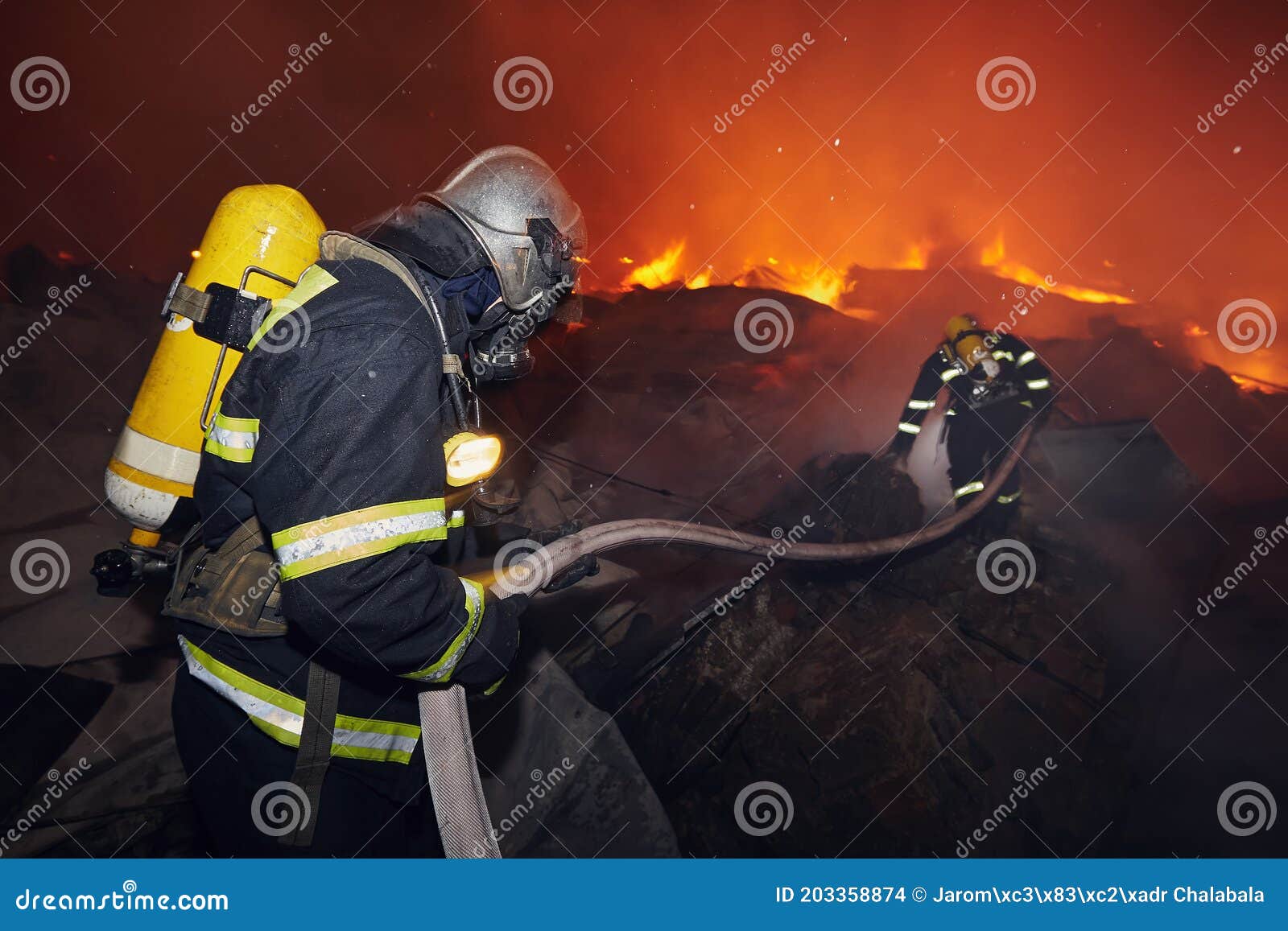 Firefighters during Extinguishing Fire of Building Stock Photo - Image ...