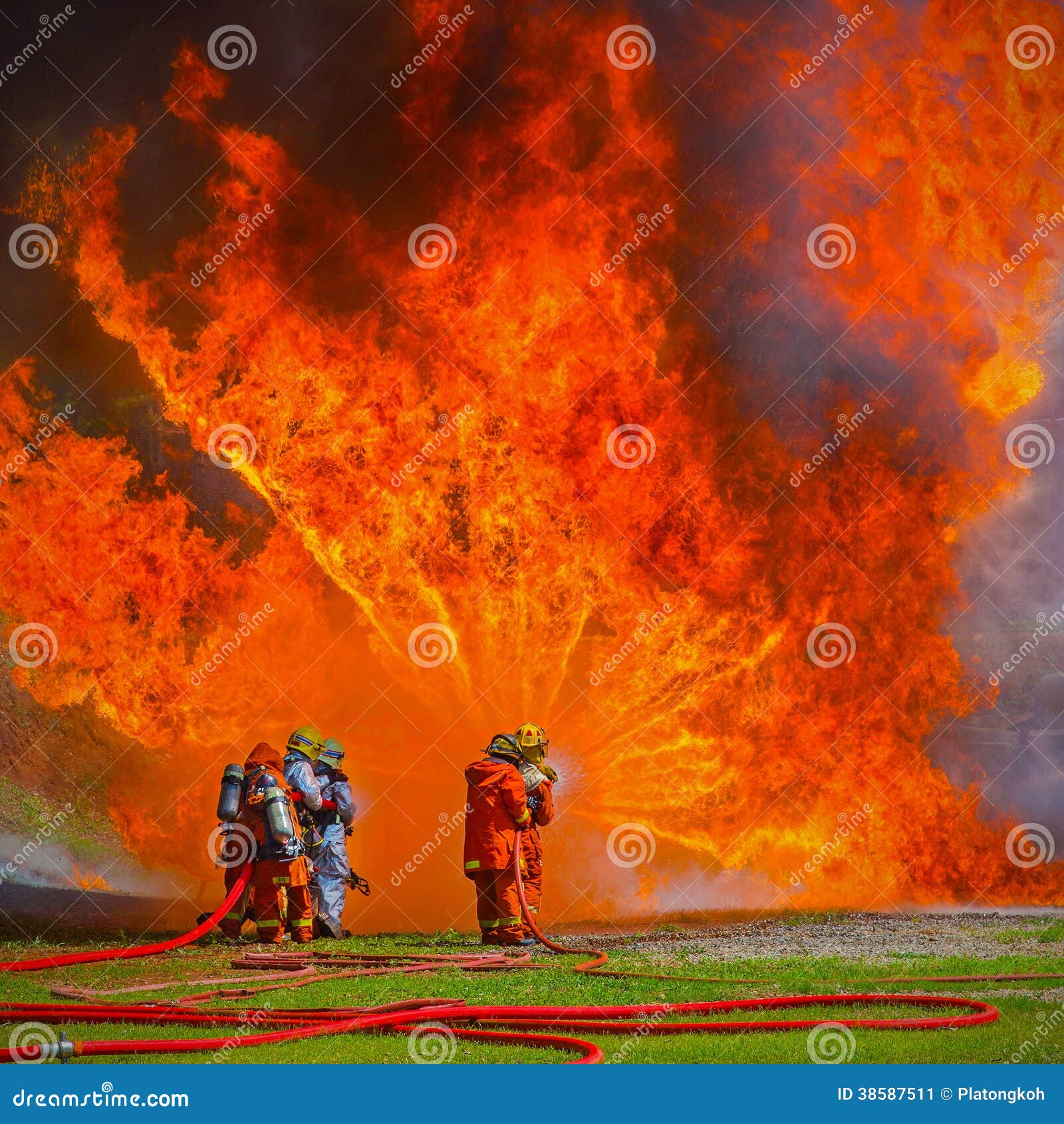 Firefighters fighting fire stock image. Image of energy - 38587511