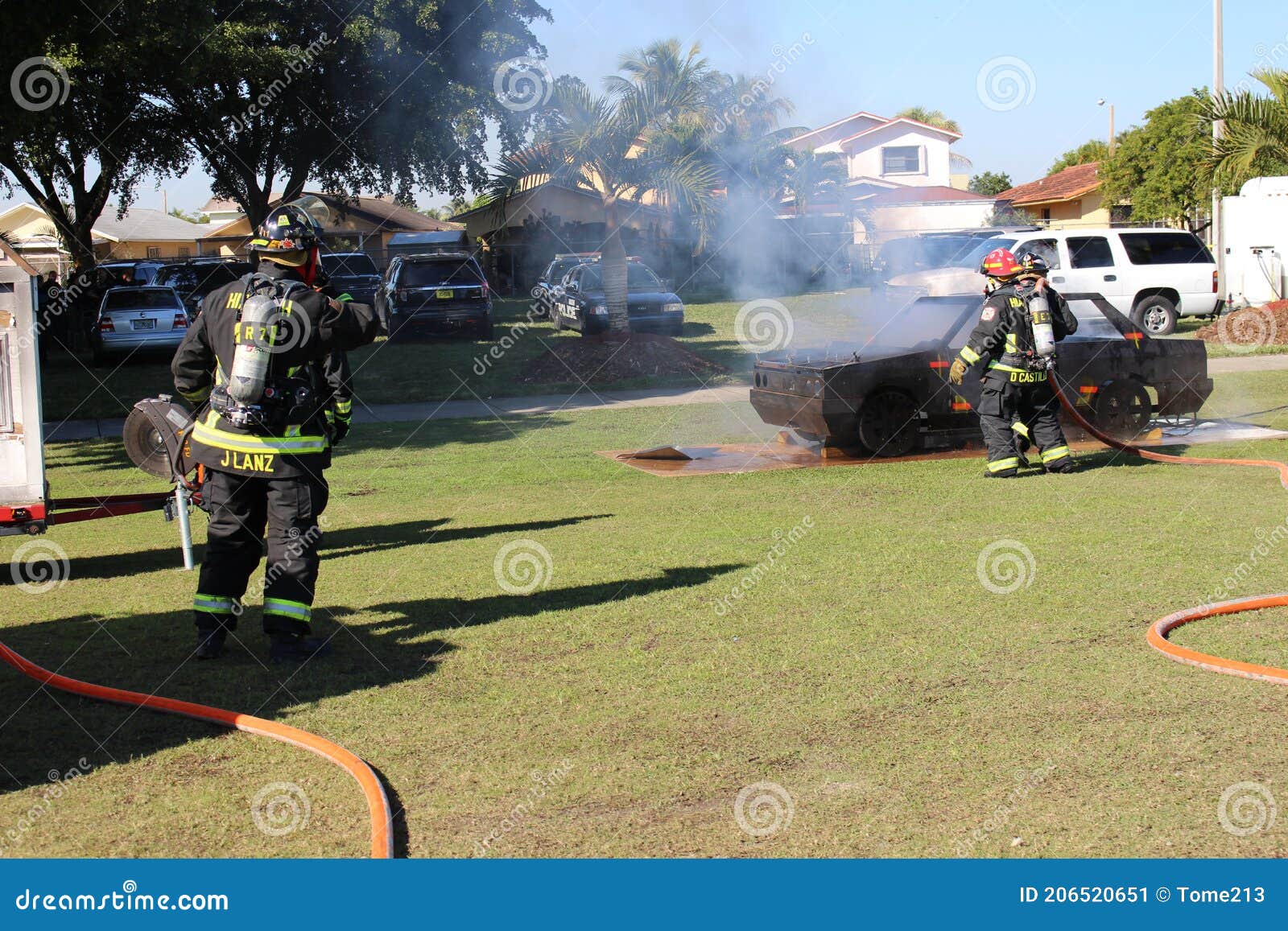 Firefighter Turning Off a Car Fire Editorial Photo - Image of responder ...