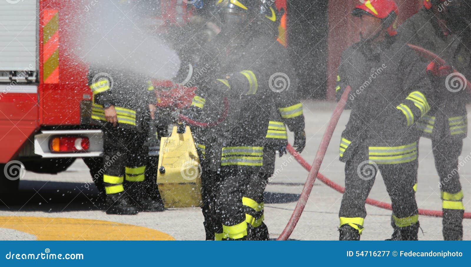 Firefighters with the Fire Extinguisher during a Practice Session Stock ...