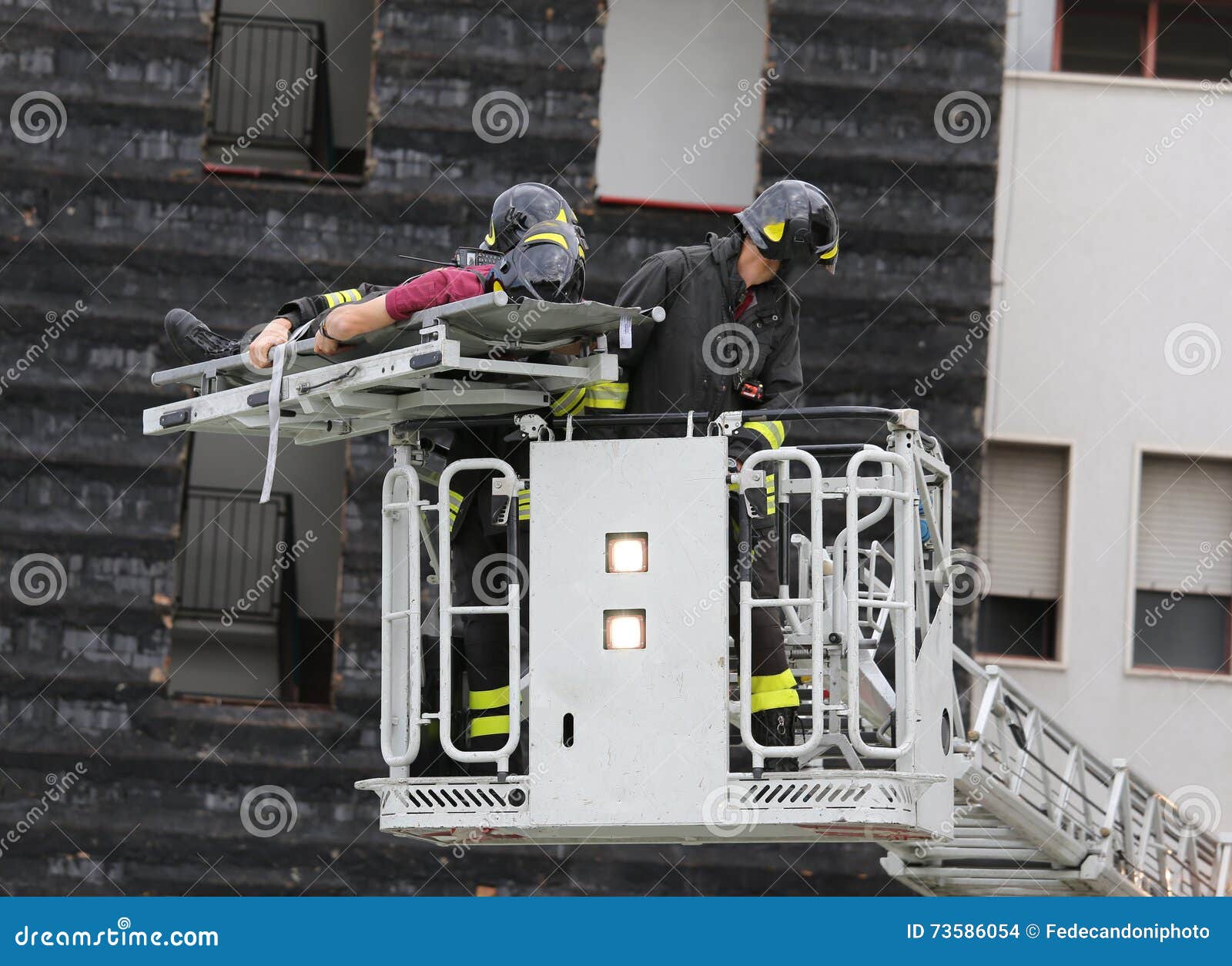 Firefighters in the Fire Truck Basket during the Practice of Training ...