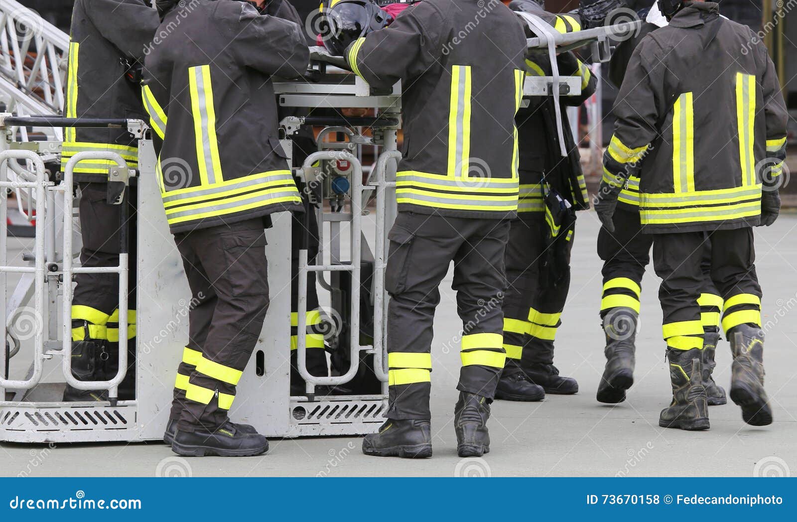 Firefighters in the Fire Truck Basket during the Practice of Tra Stock ...