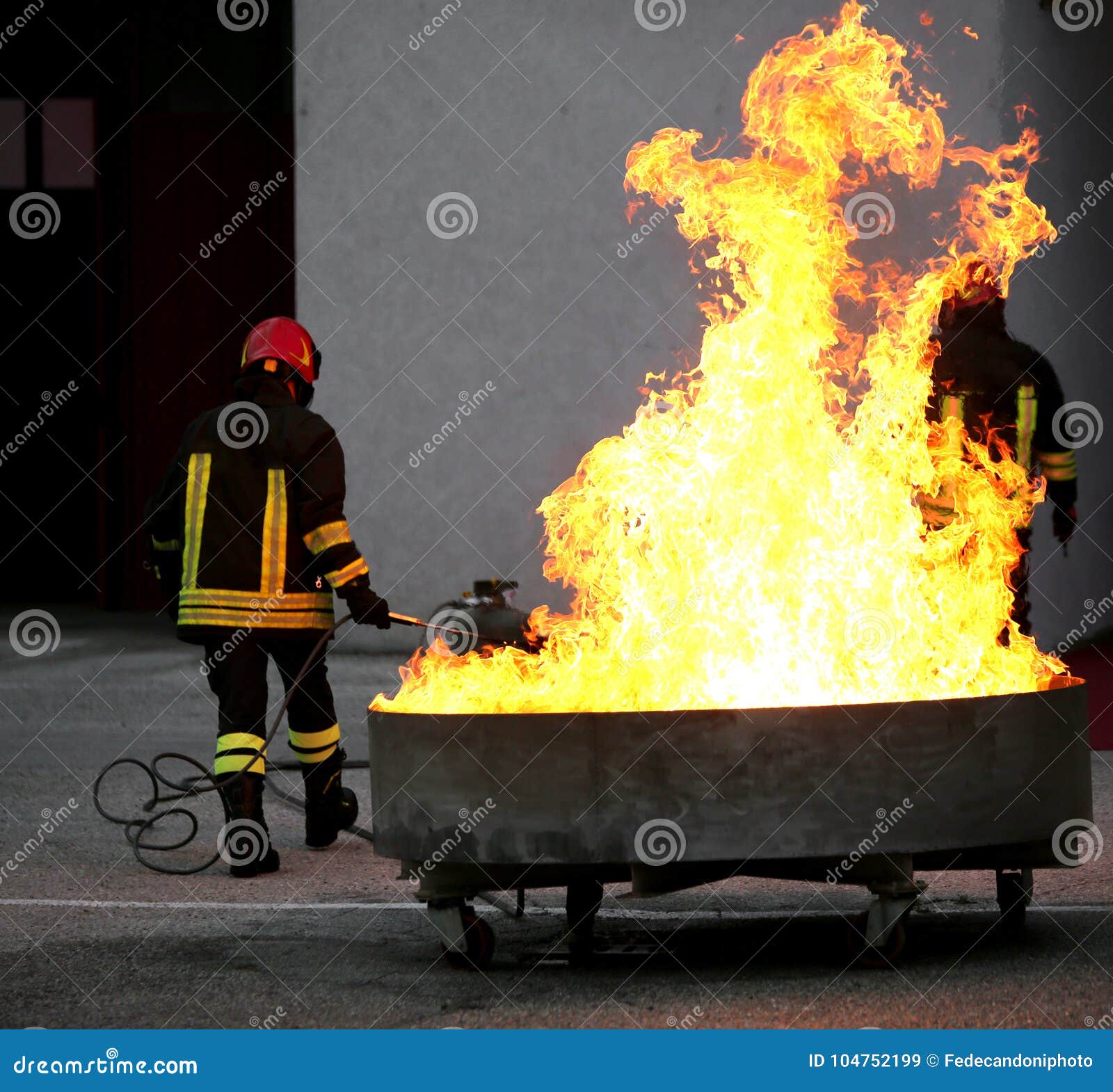 Firefighters during a Firefighting Exercise Editorial Stock Image ...