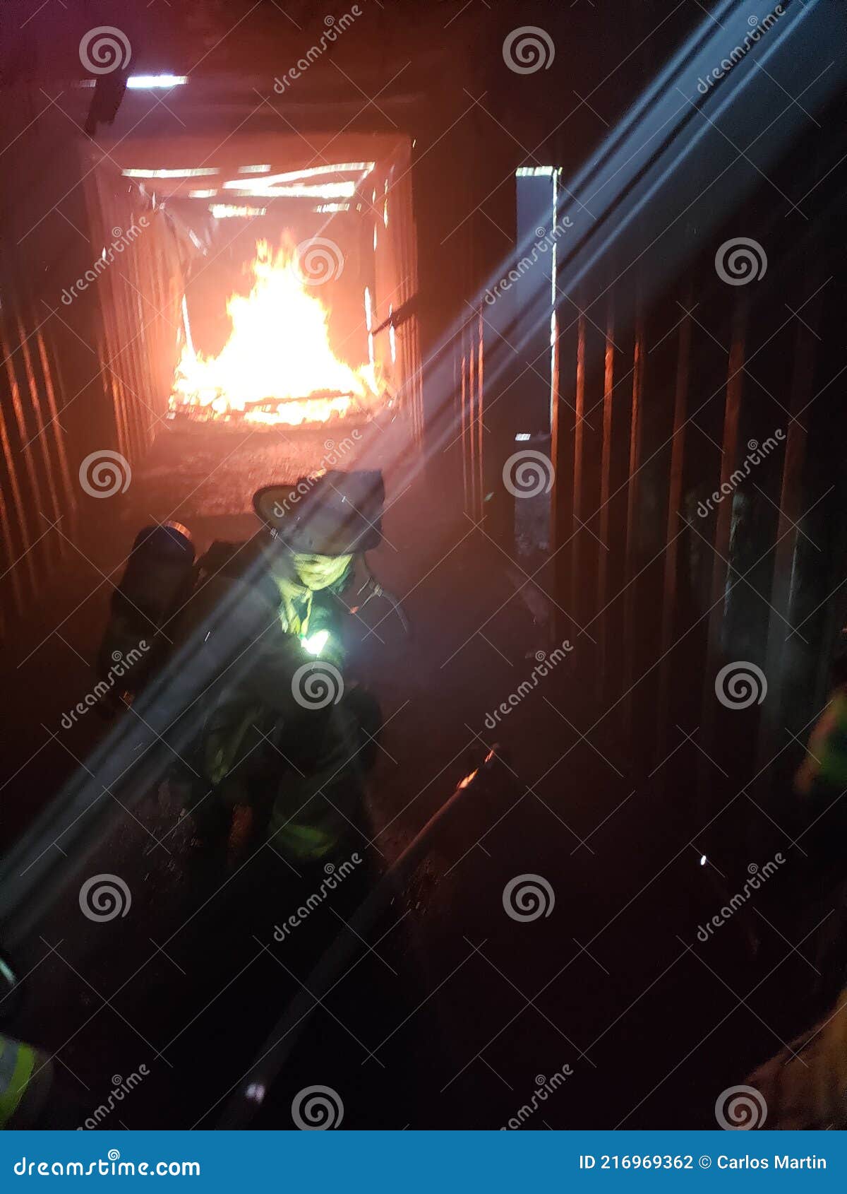 Firefighters hard at work stock photo. Image of games - 216969362