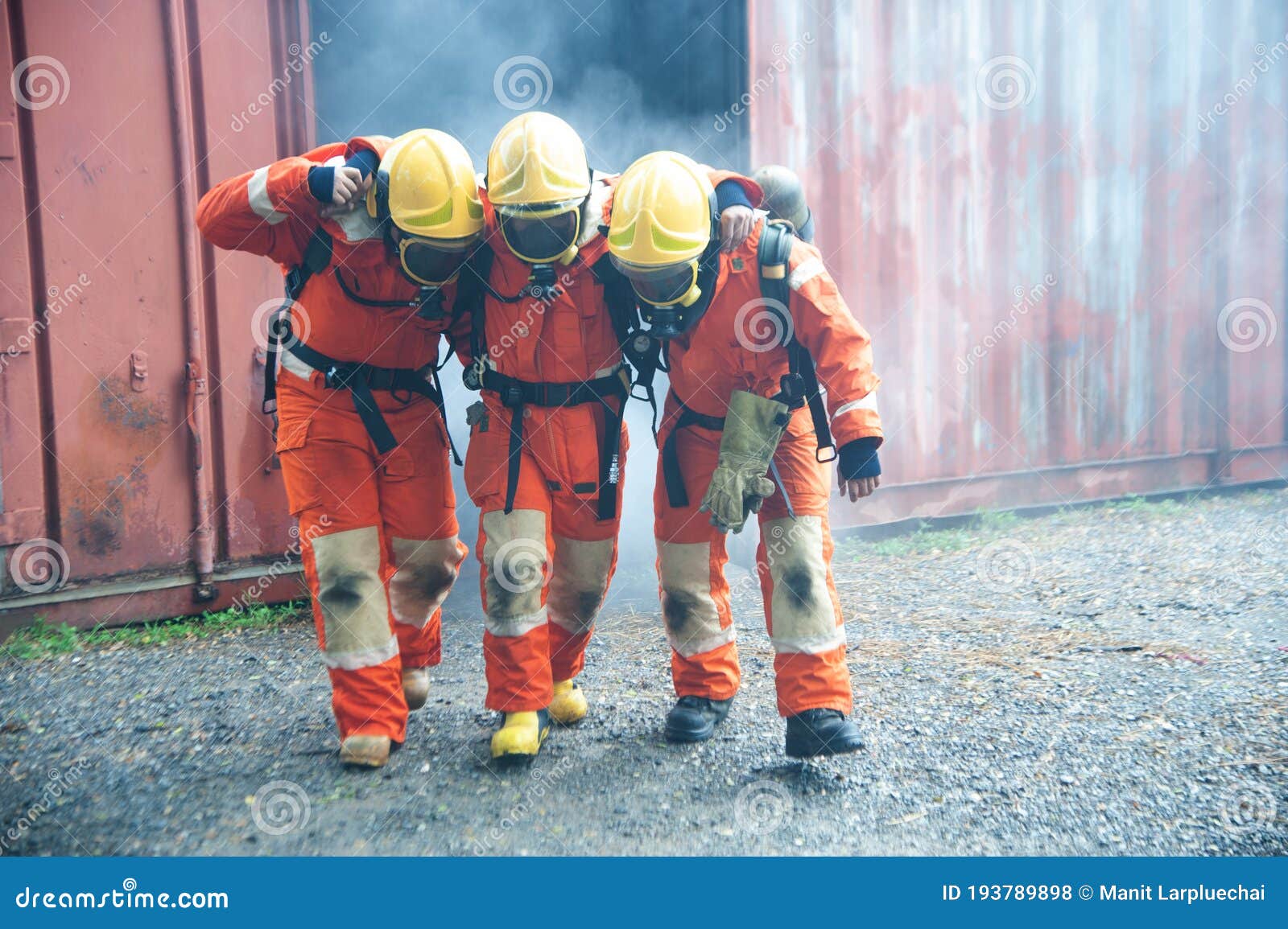 Firefighters are Helping Workers by Pulling Out of the Burning Building ...