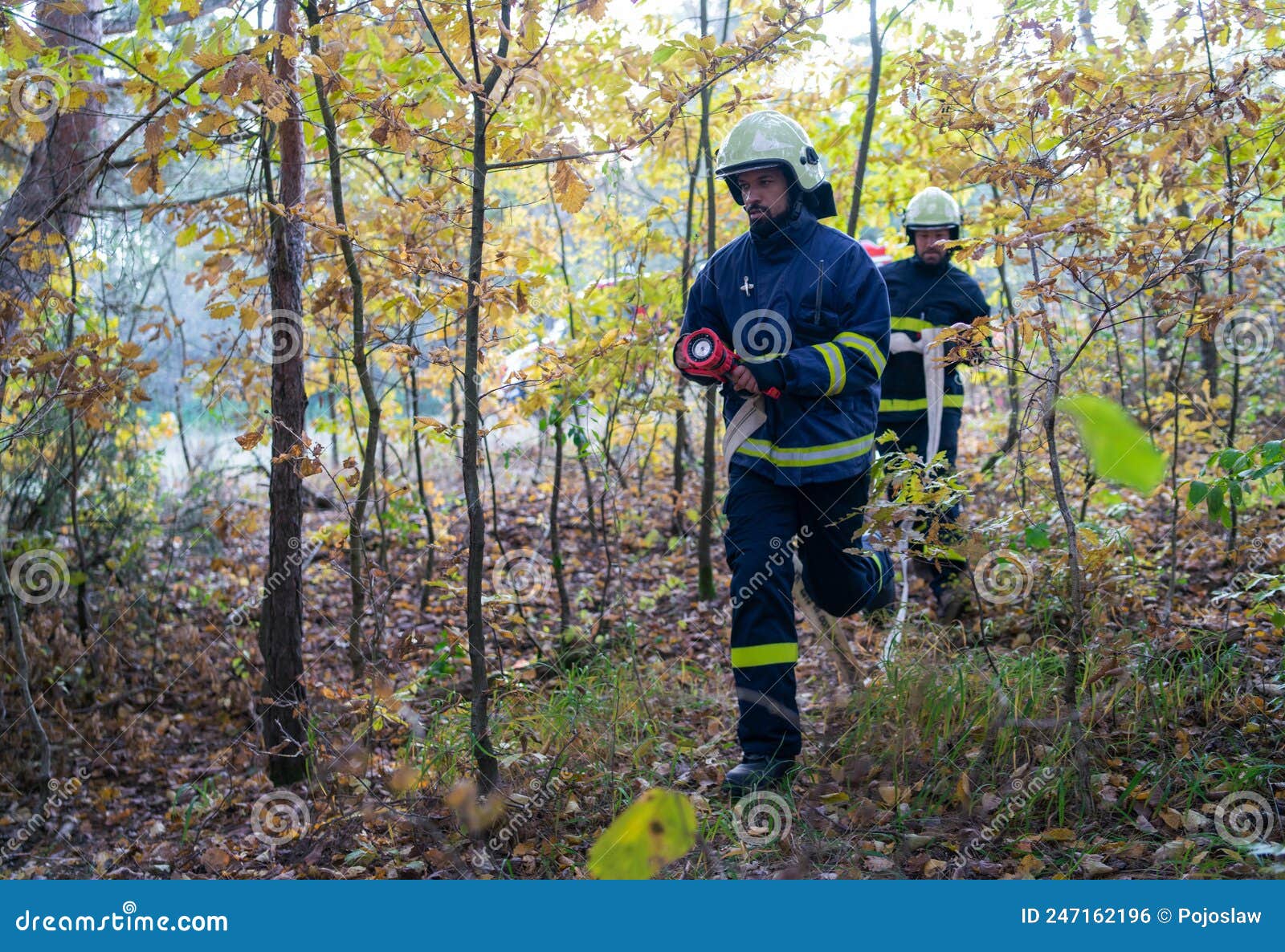 Firefighters Men at Action, Running through Smoke with Shovels To Stop ...