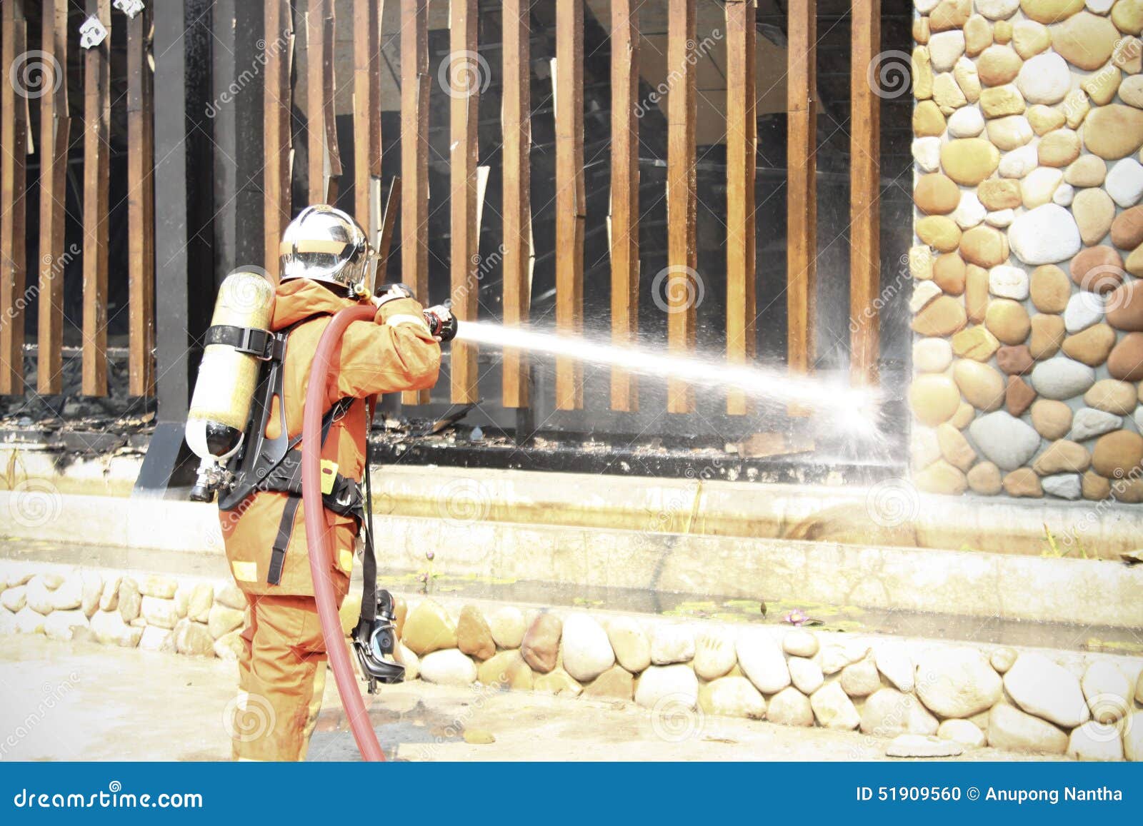 Firefighters Prepare To Attack a Propane Fire during a Training ...