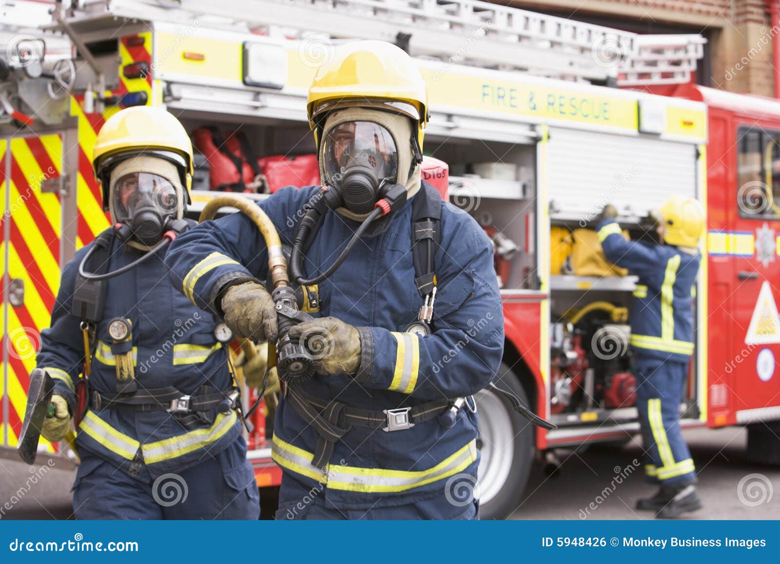 Firefighters in Protective Workwear Stock Photo - Image of courage ...