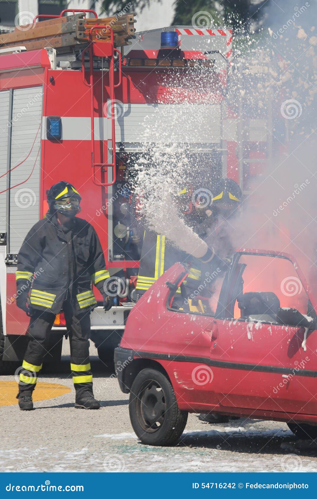 Firefighters Put Out the Fire with Foam in the Car Stock Photo - Image ...