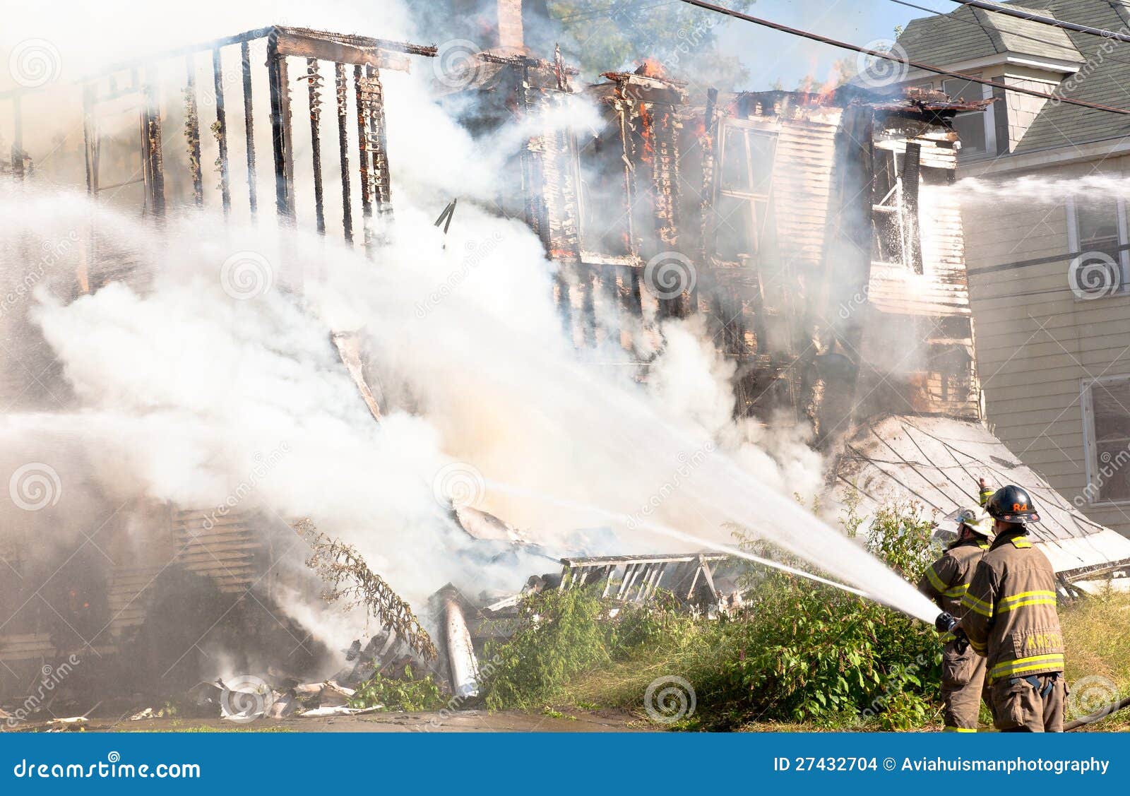 Firefighters Putting Out a Fire Editorial Stock Image - Image of ...